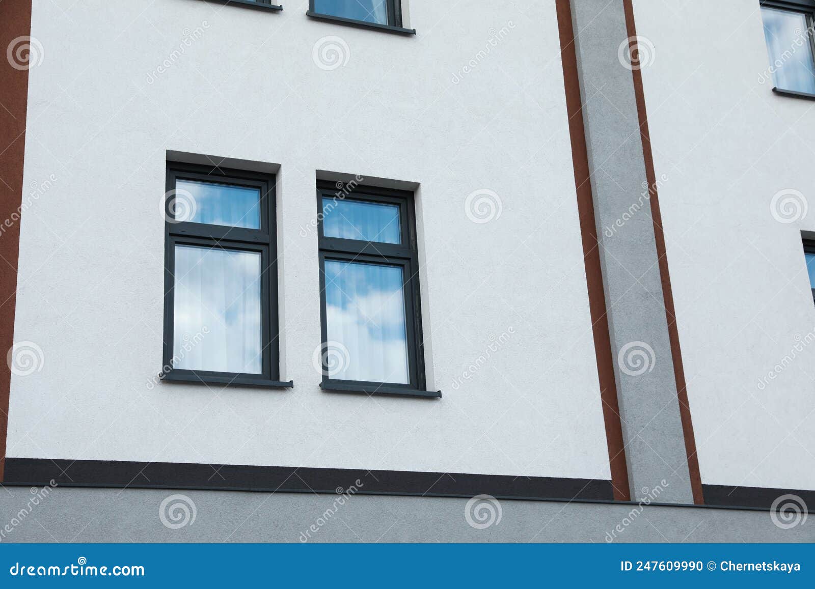 View of Building with Stylish Dark Grey Windows Stock Photo - Image of ...