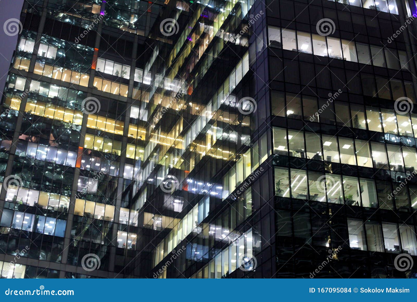View of the Burning Windows of the Modern Office Building at Night. the ...