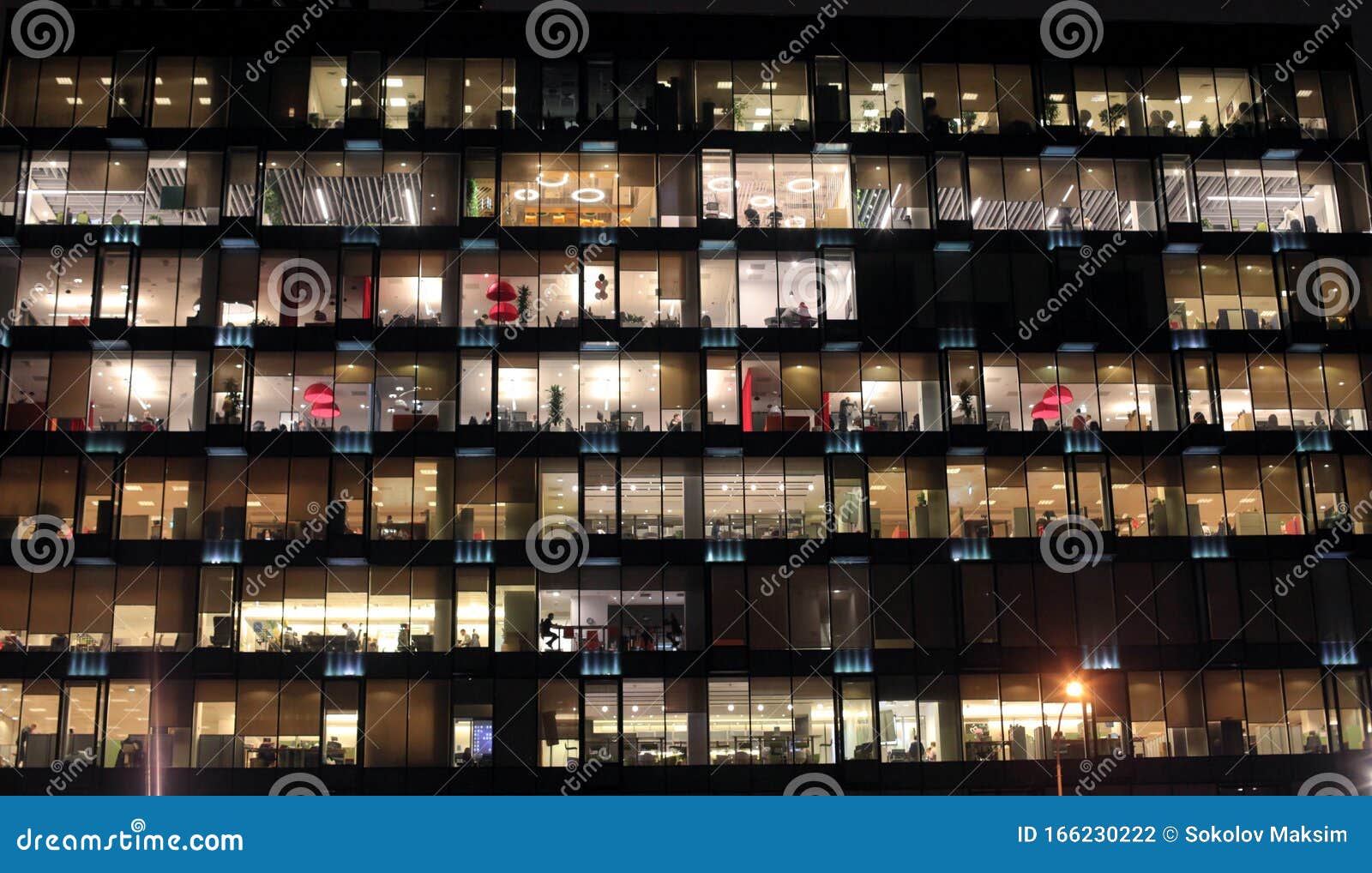 View of the Burning Windows of the Office Building at Night. the Work ...