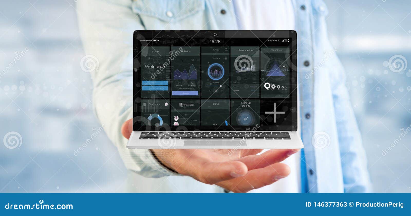 Businessman Holding Laptop with Business User Interface Data on the ...