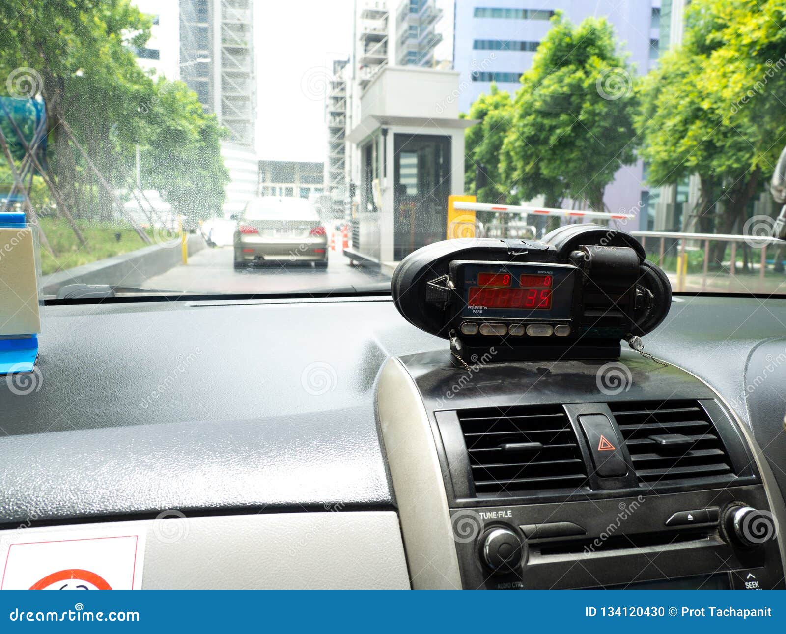 View from Cab with Meter Display Time, Distance and Fare in Dashboard ...