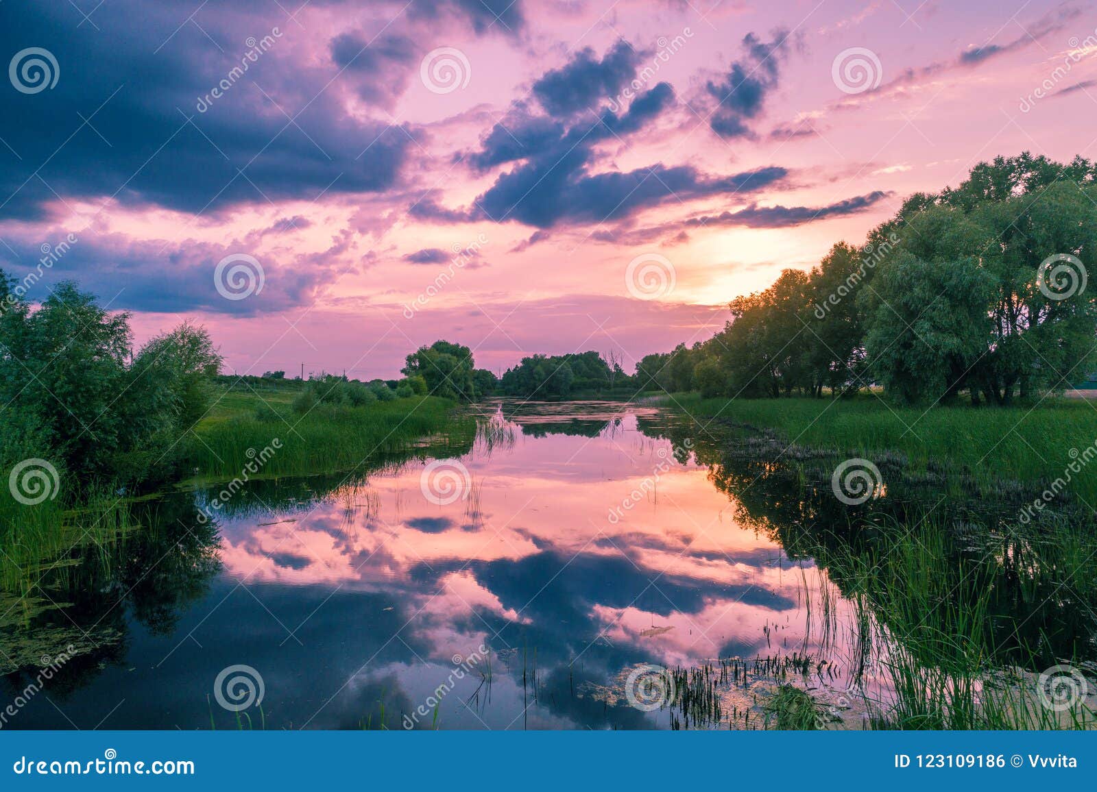 View of a Calm Lake in the Evening Stock Photo - Image of park, pink ...