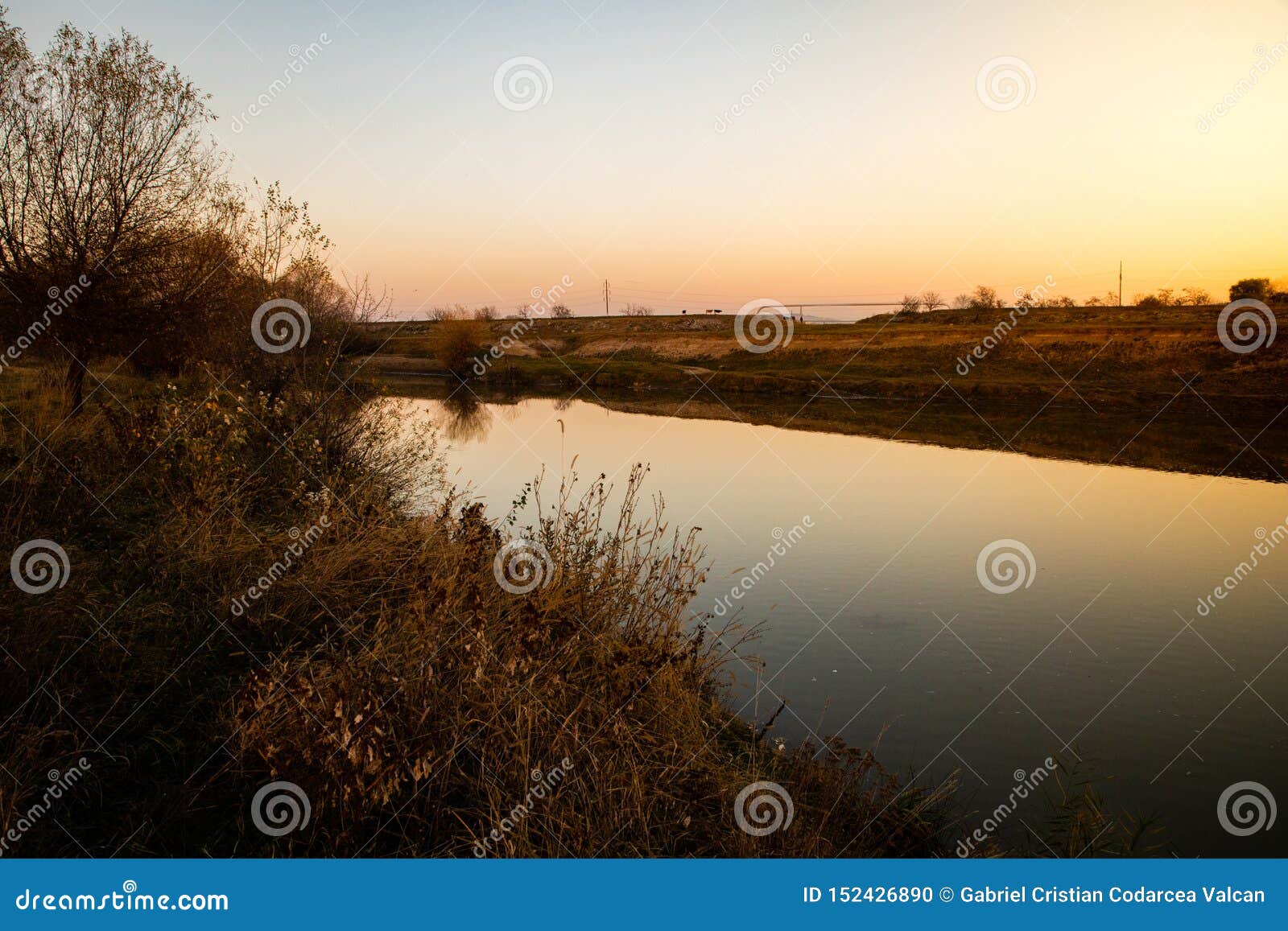 View of a Calm River with Sunset Light Stock Photo - Image of landscape ...