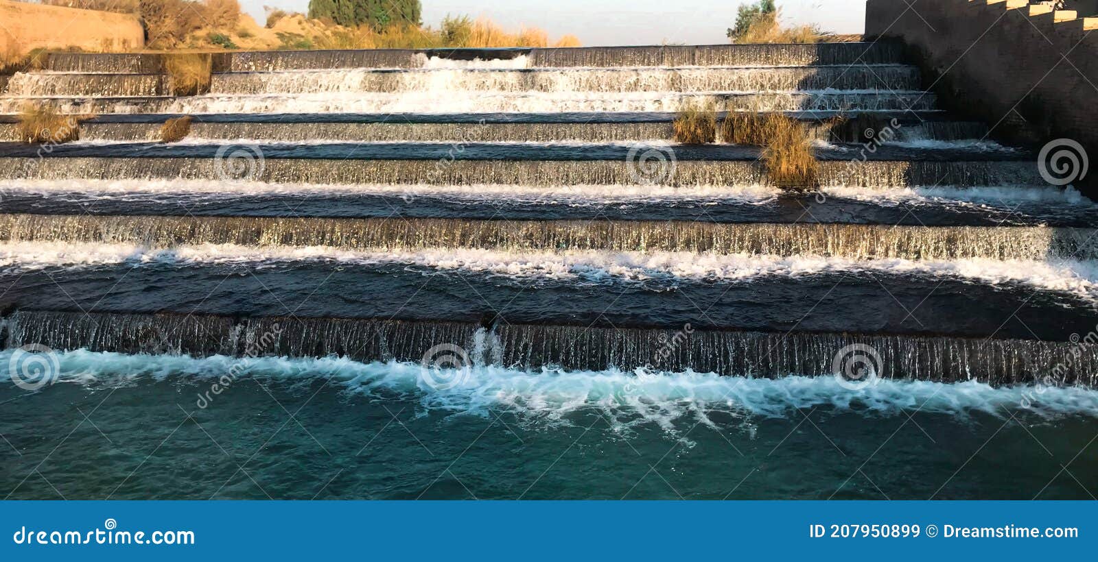 View of Canal Falling into River. Stock Image - Image of waterfall ...