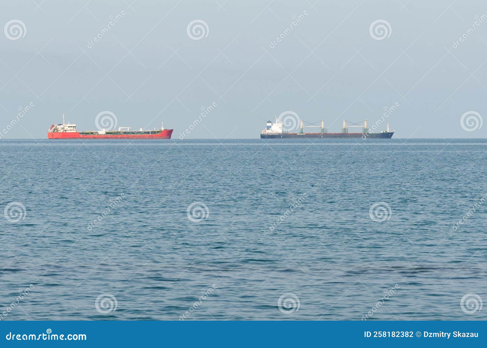 A View of Cargo Ships Moving Far Across the Sea. Stock Photo - Image of ...
