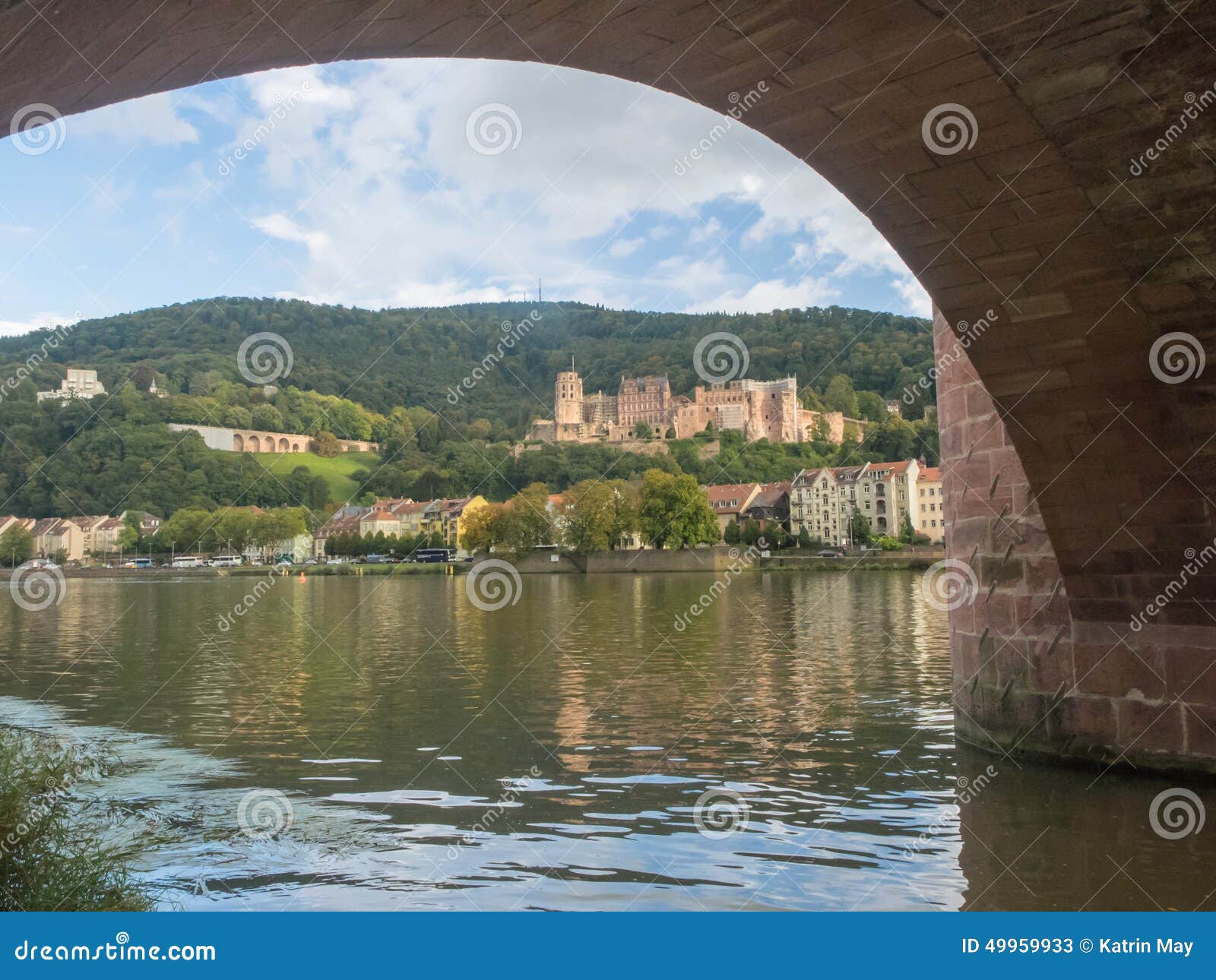 View of a Castle through the Arch of a Bridge Stock Image - Image of ...