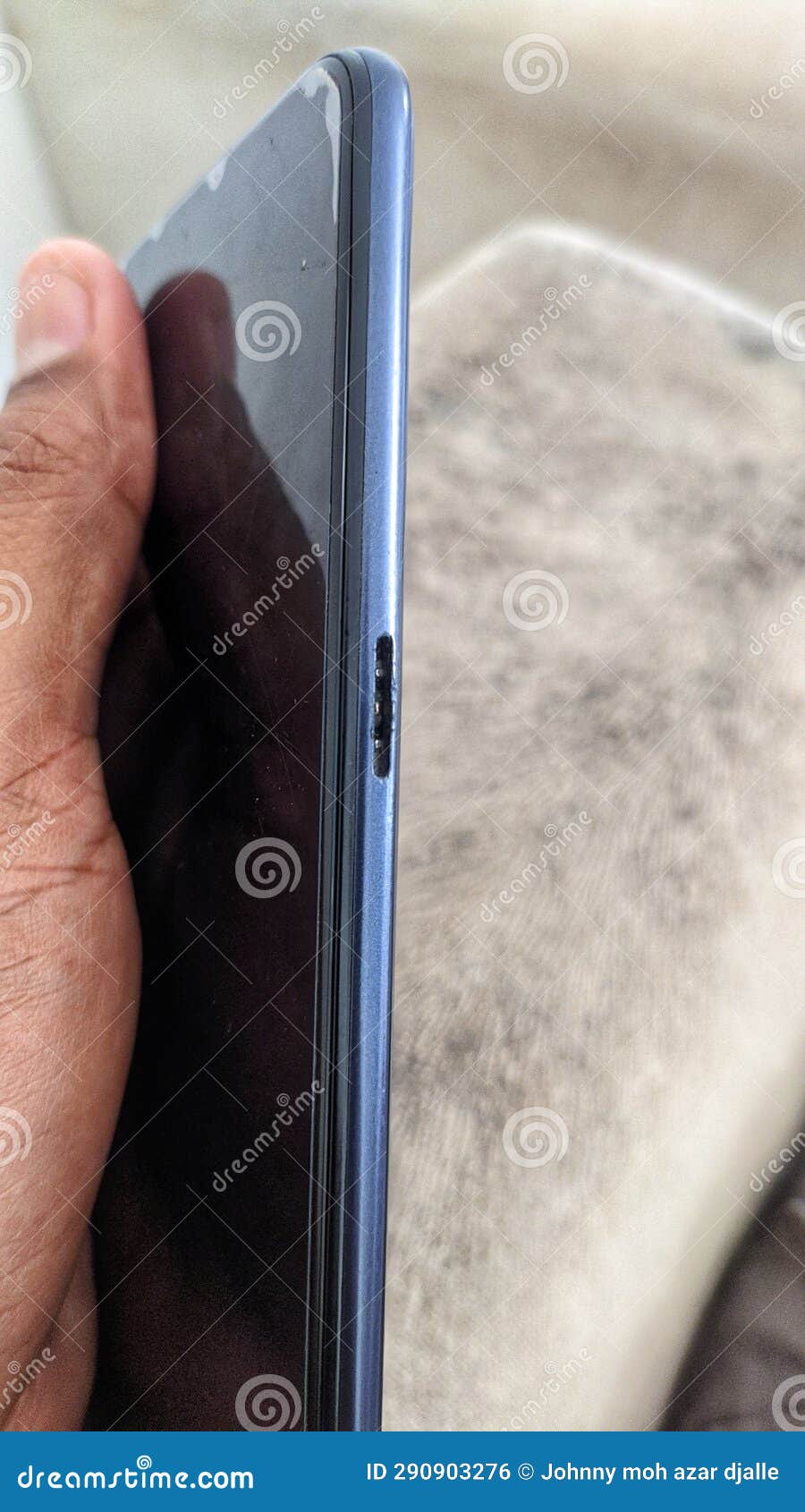 View of cell phone in hand stock photo. Image of brown - 290903276