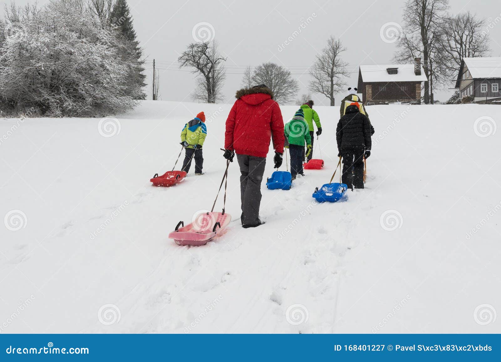 Children Pulling Sled on Snowy Hill Stock Image - Image of active ...