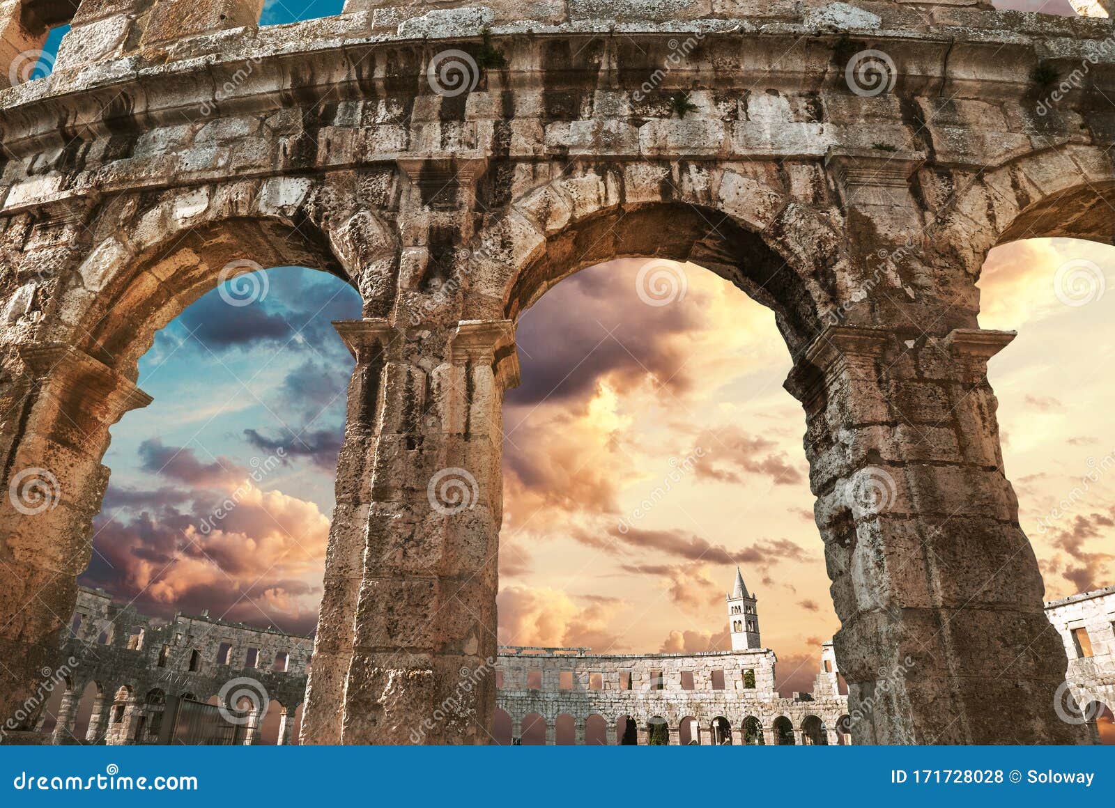 View on Church Bell Tower through Amphitheater Arches Stock Photo ...
