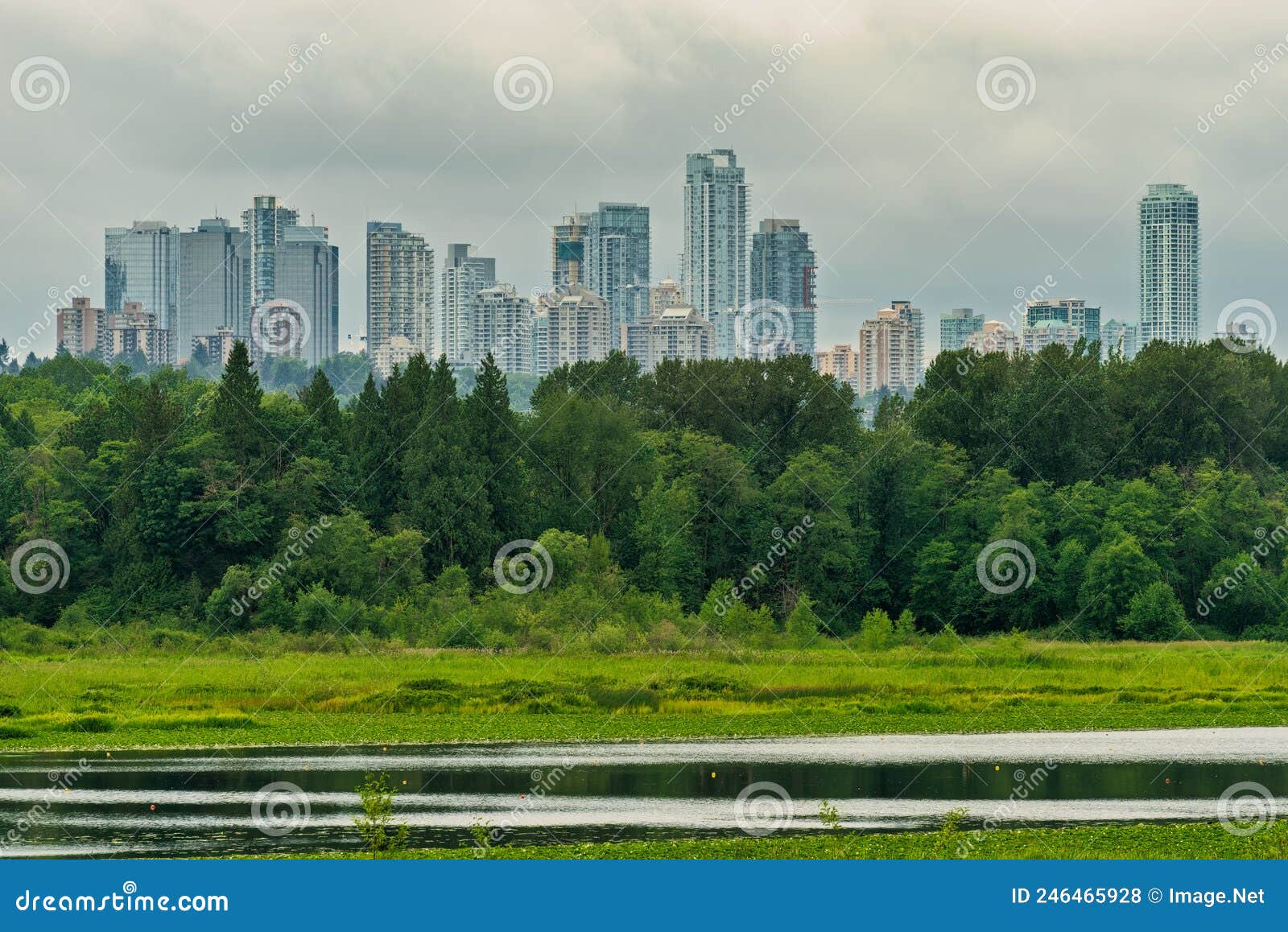 Overview Of Metrotown Cityscape On Cloudy Sky Background Royalty-Free ...