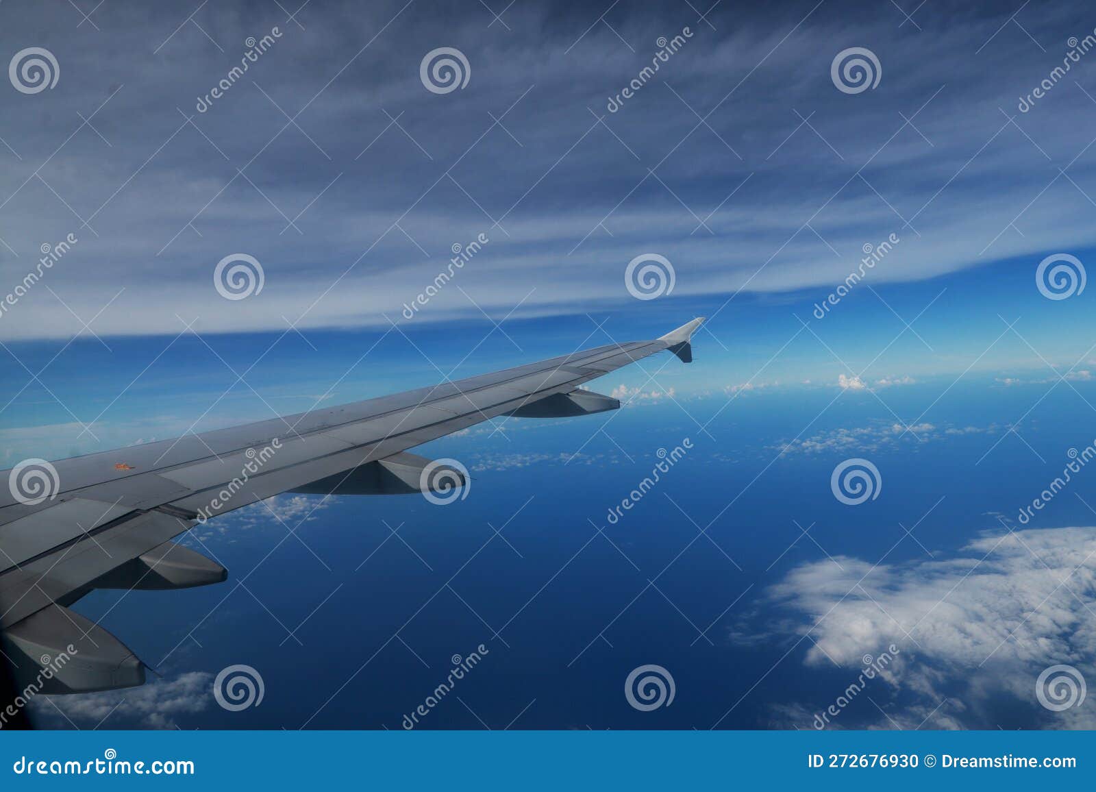 View of the Clear Blue Sky from Behind the Airplane Window Stock Photo ...