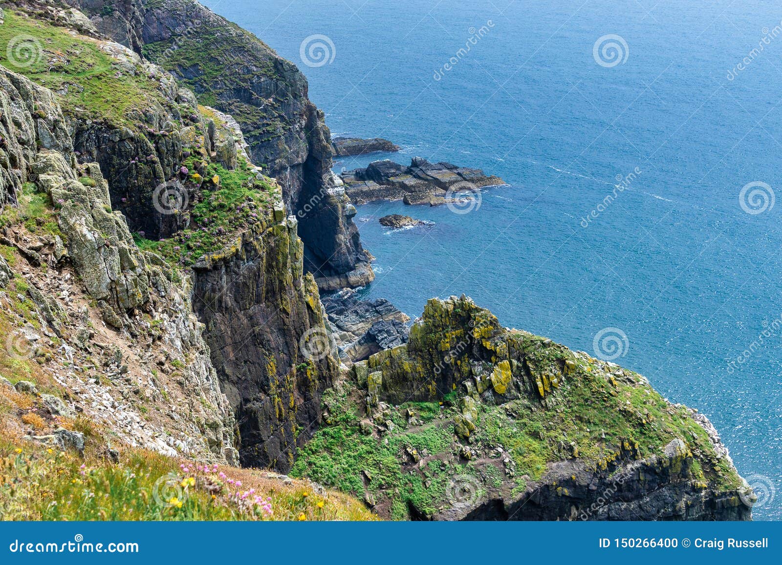 View of a Cliff Face in Anglesey Stock Photo - Image of coast, wall ...