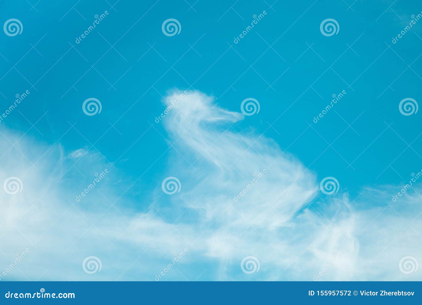 View of a Cloud in the Form of a Duck Against the Blue Sky. Stock Photo ...
