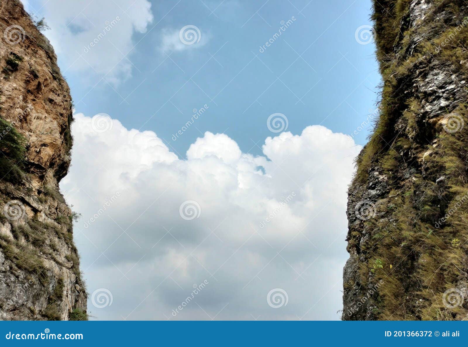 View of Clouds between Two Cliffs Stock Photo - Image of clouds, nature ...