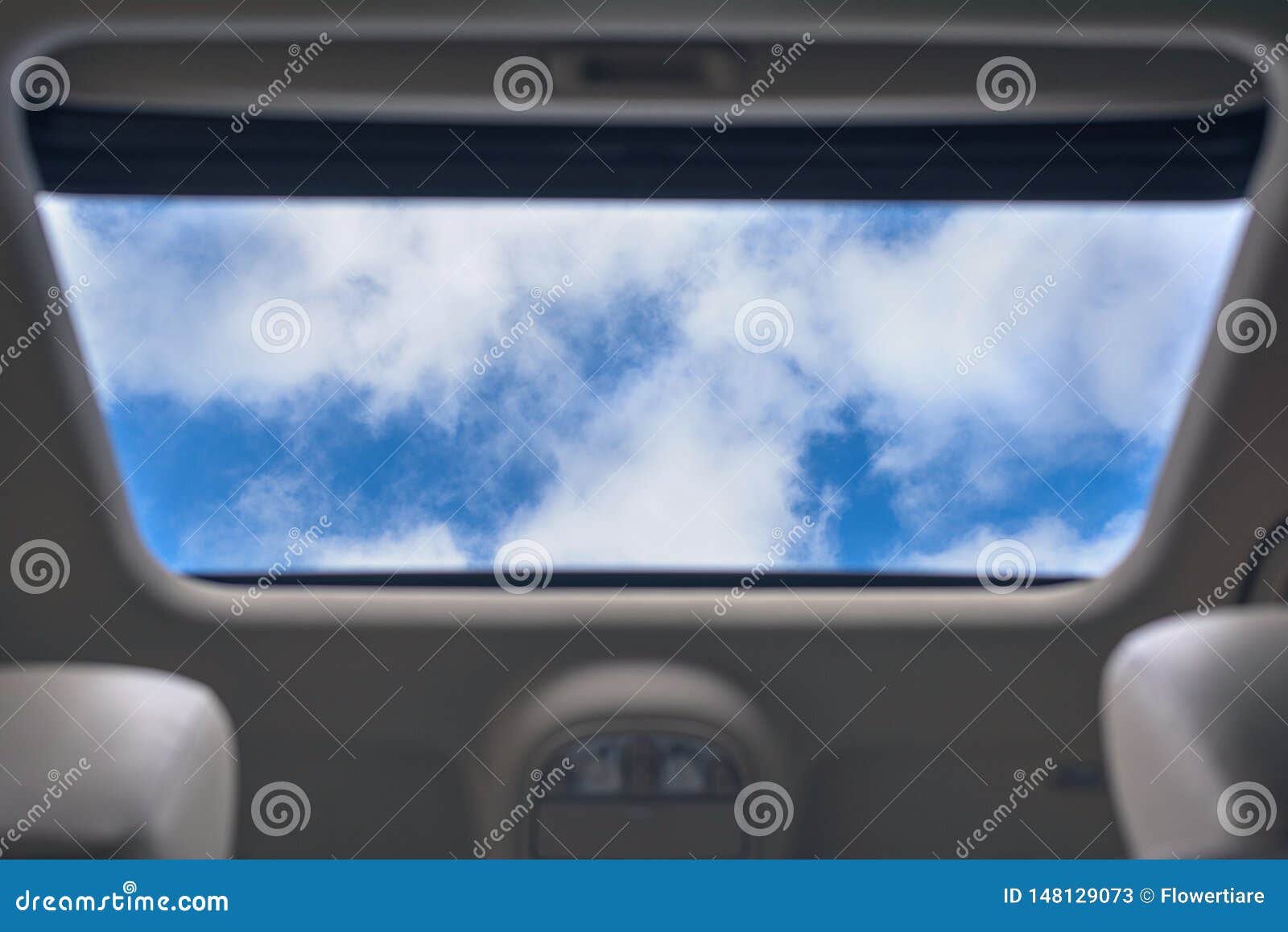 View of the Cloudy Sky through the Open Hatch of the Car. Stock Image ...