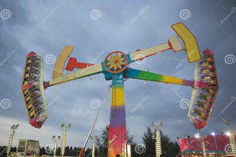 View of Colorful Summer Carnival Ride at Fun Fair during Dusk Stock ... View of Colorful Summer Carnival Ride at Fun Fair during Dusk Stock ...