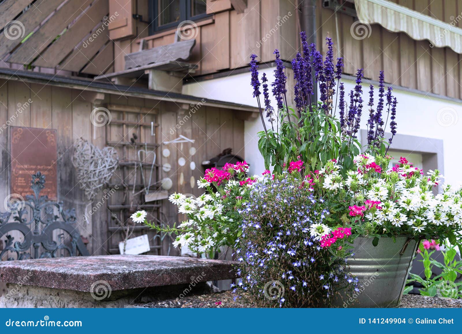 View of the Composition of Flowers in a Tin Basin on the Background of ...