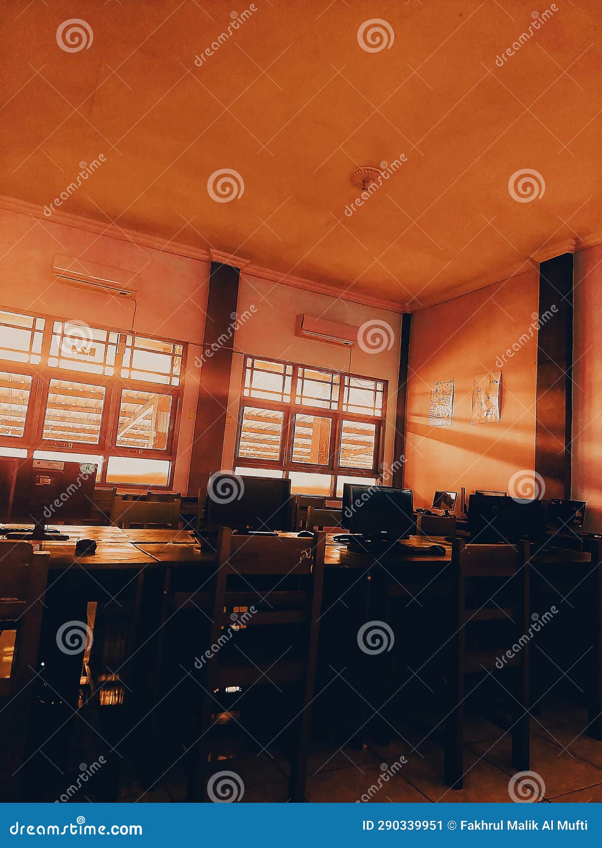 View of Computer Laboratory with Orange Lighting from Windows Stock ...