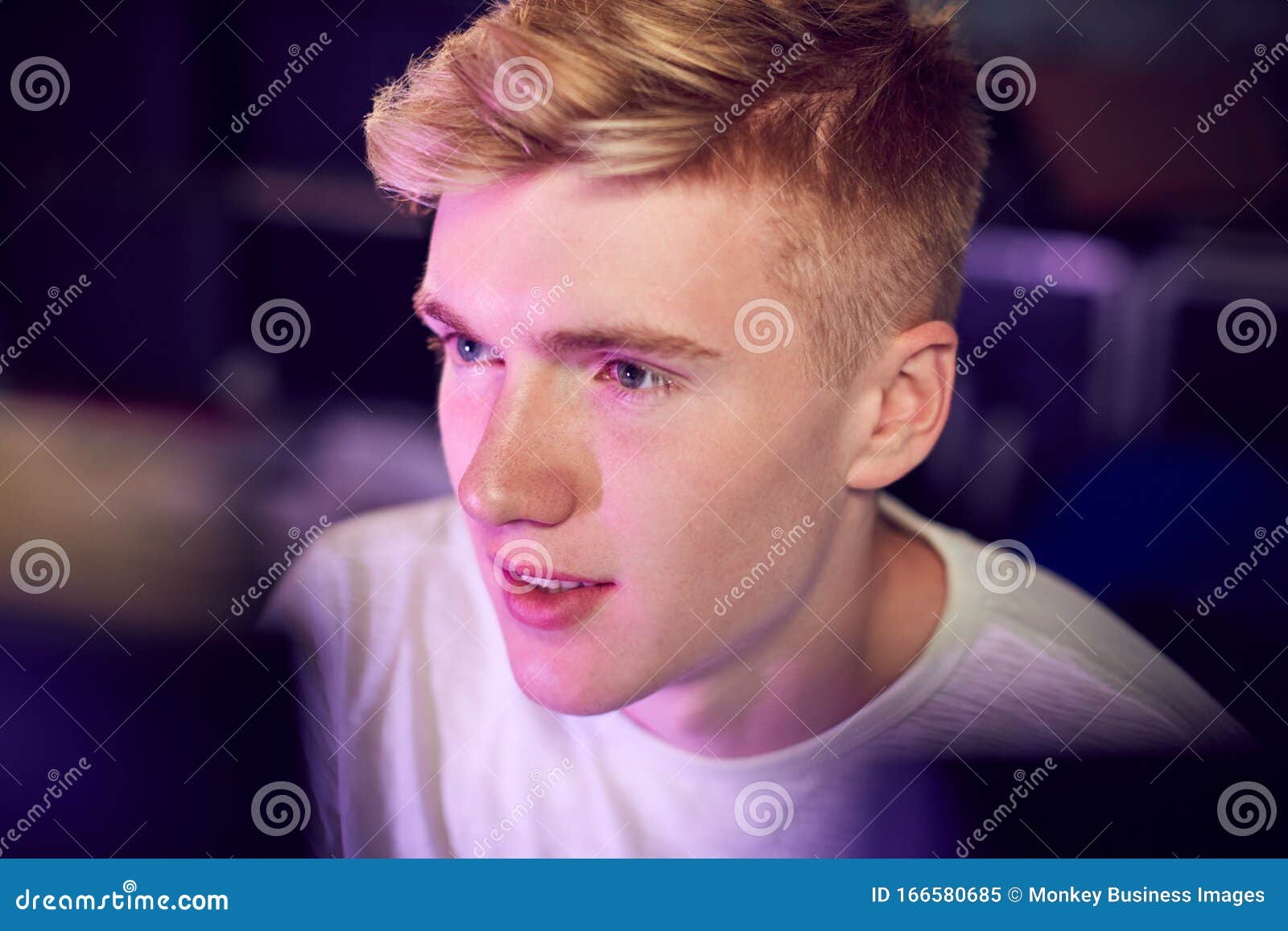 View between Computer Screens of Teenage Boy Gaming at Home Stock Image ...