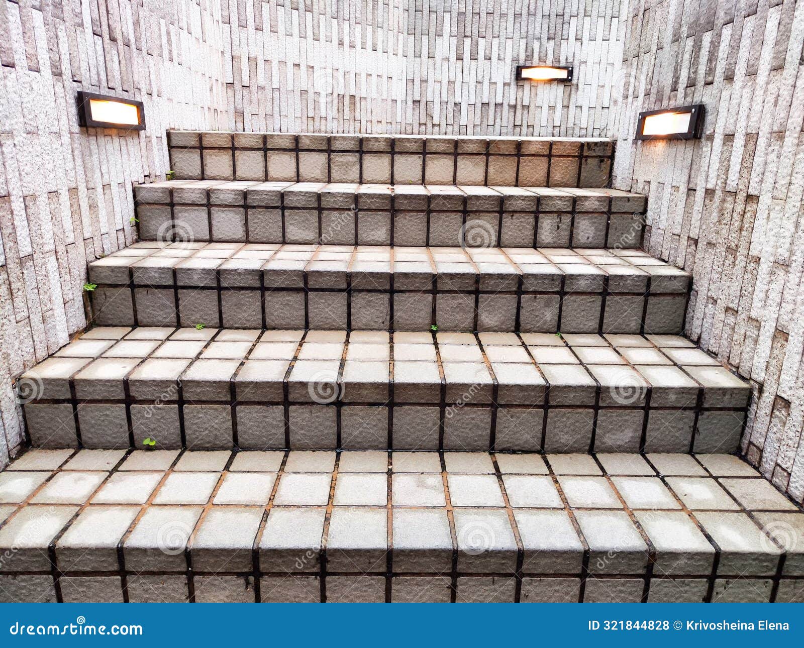 A View of a Concrete Staircase with Three Steps, Flanked by Brick Walls ...