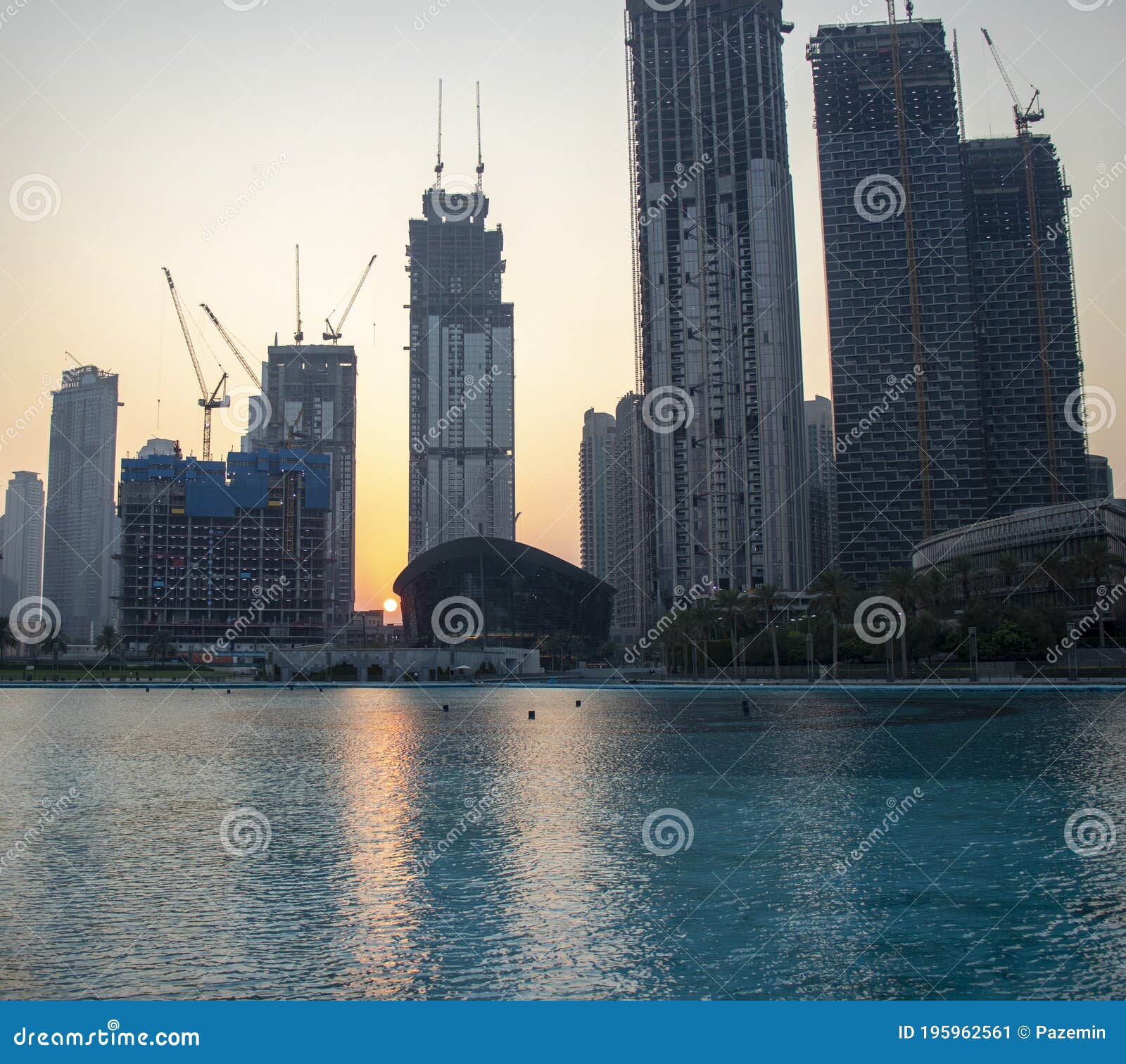 View of a Construction in Downtown Dubai and Dubai Opera during Sunset ...
