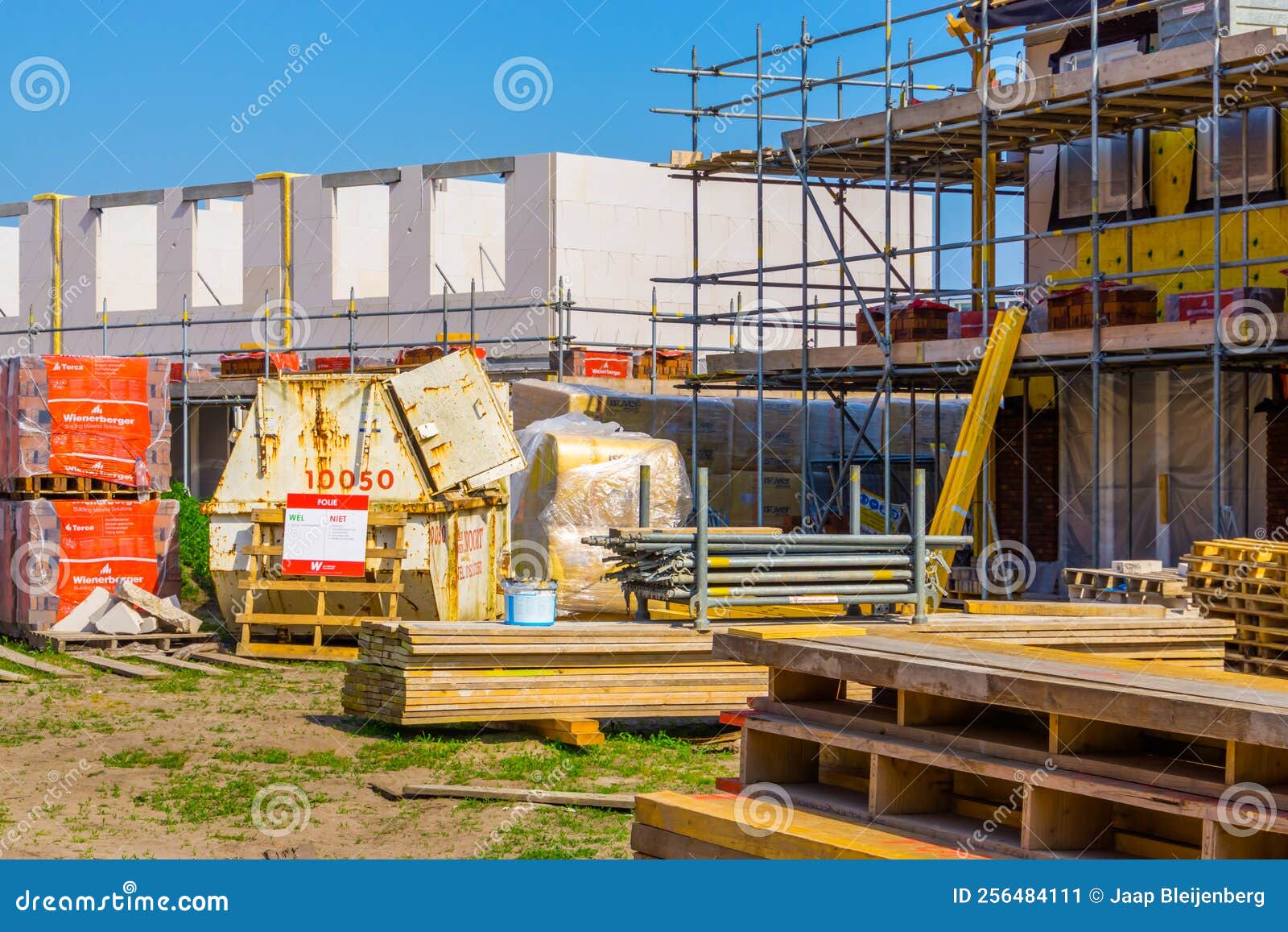 View on a Construction Site with Recycle Bin and Build Materials, House ...