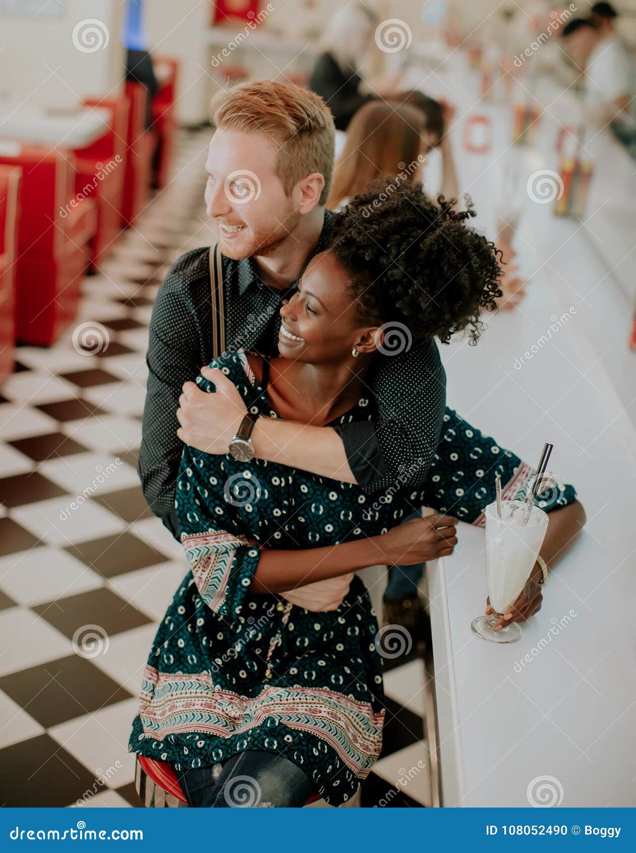 Couple Hugging by the Bar in the Diner Stock Photo - Image of diner ...