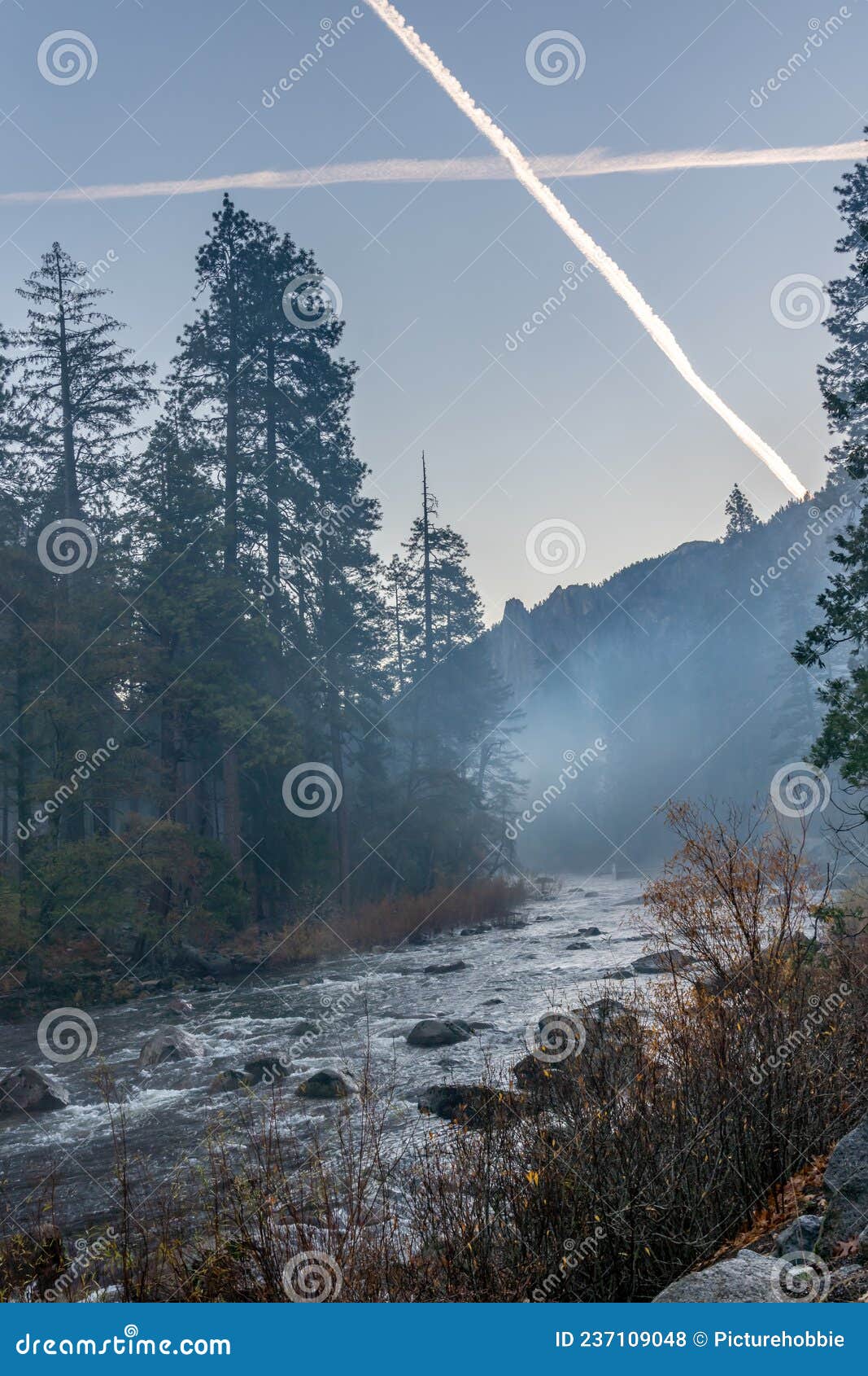 View of Dense Cloud Following the River Path with Clear Skies Stock ...