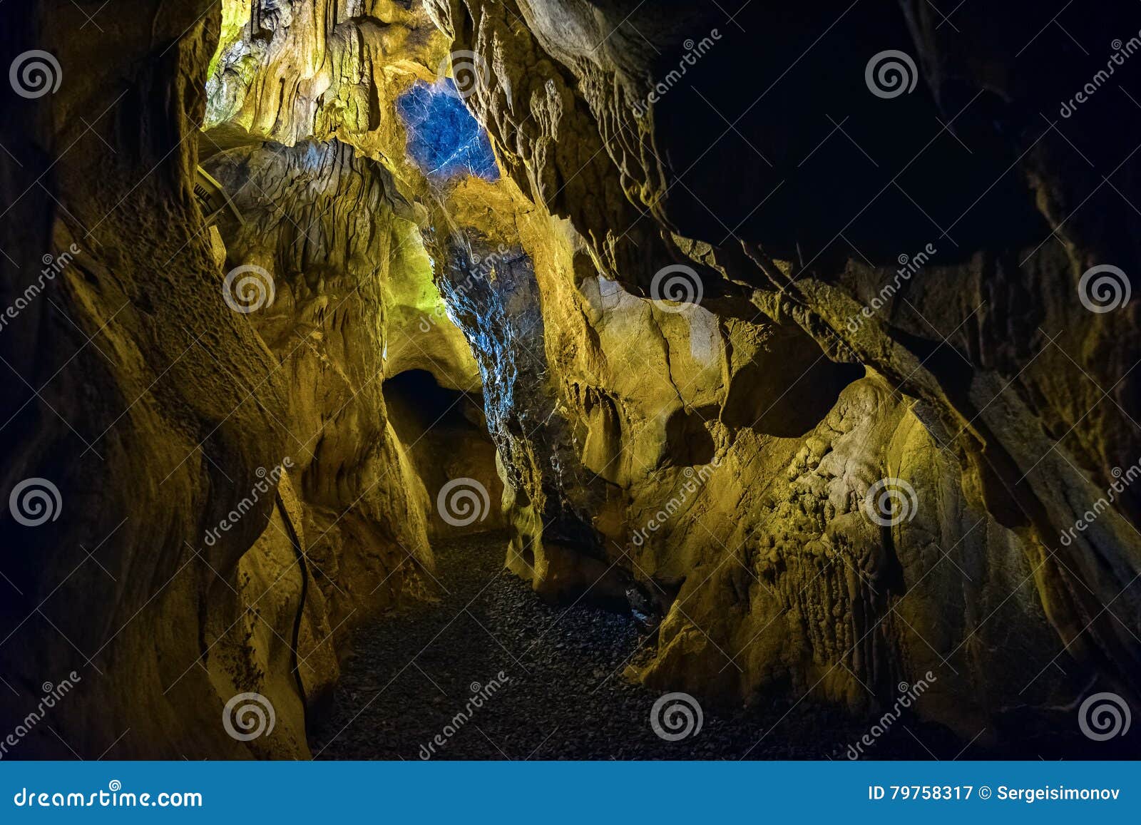 View of Dim Cave stock image. Image of rocky, light, calcite - 79758317