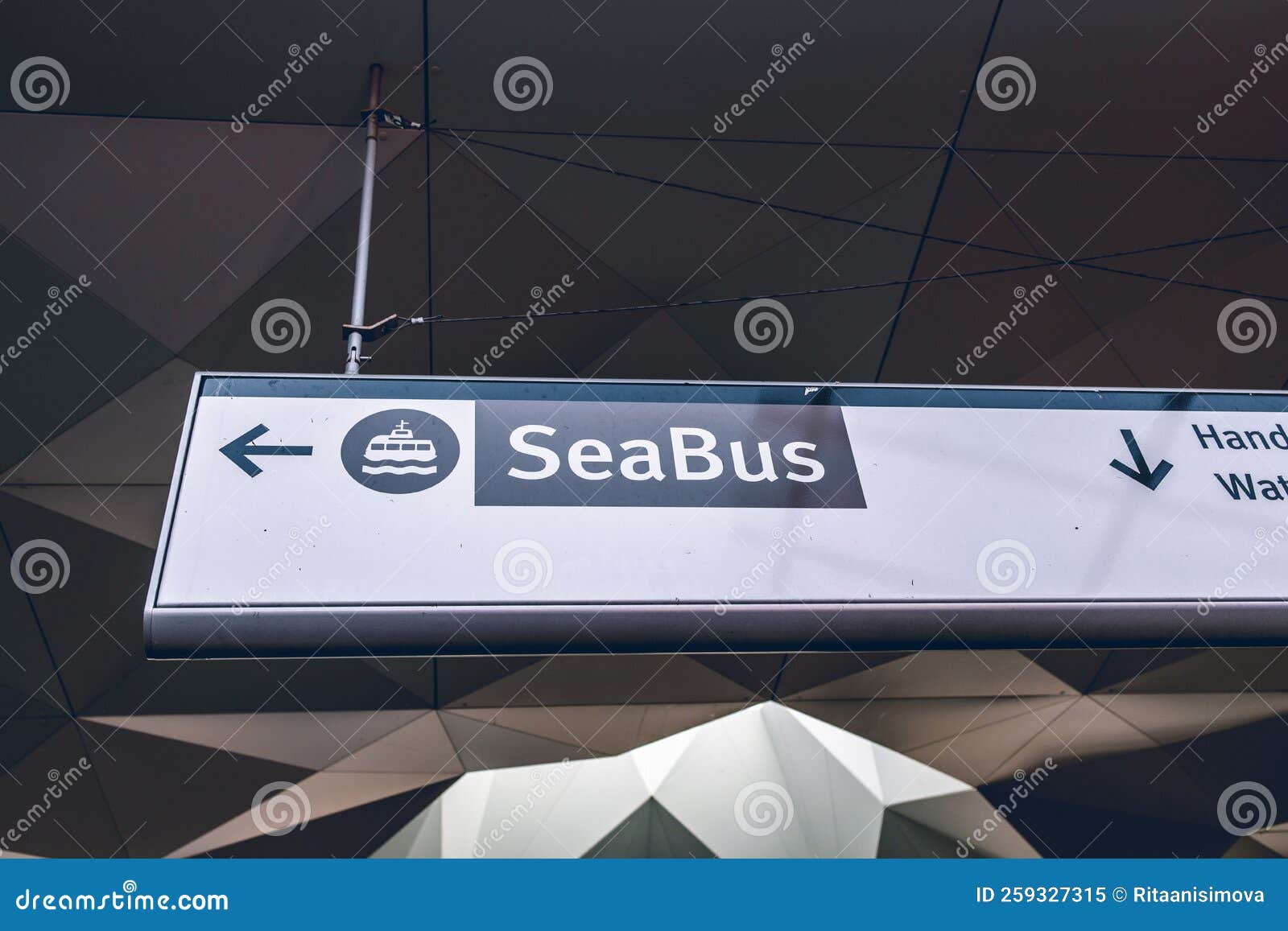 A View of Directional Sign Which Points Toward the SeaBus Terminal ...