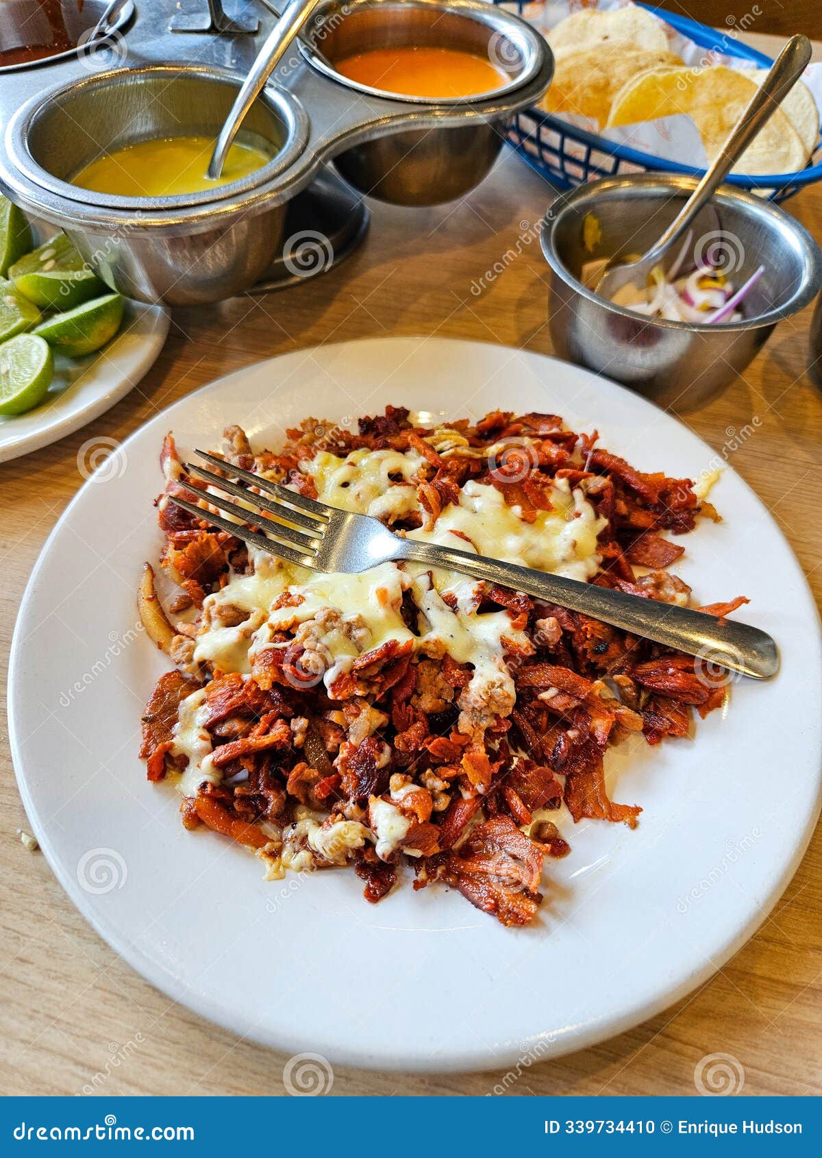 View of a Dish of Meat Al Pastor with Cheese Accompanied with Lemon and ...