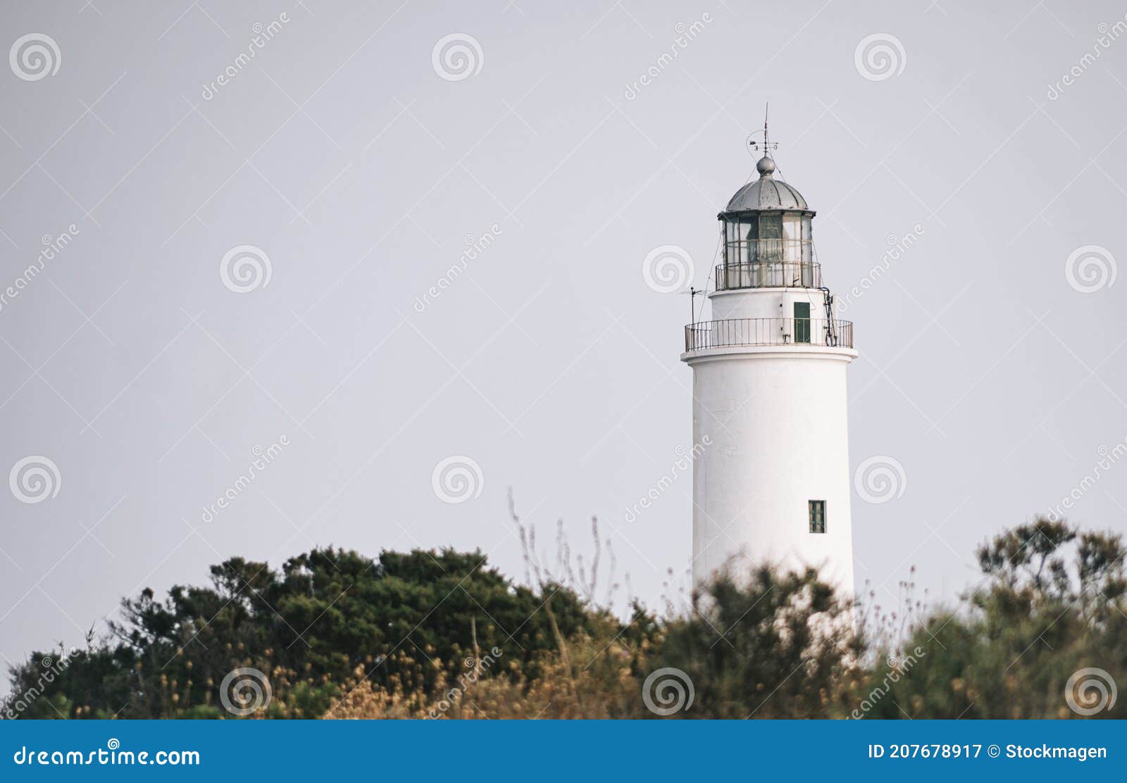 View from a Distance of a Lighthouse Stock Image - Image of horizon ...