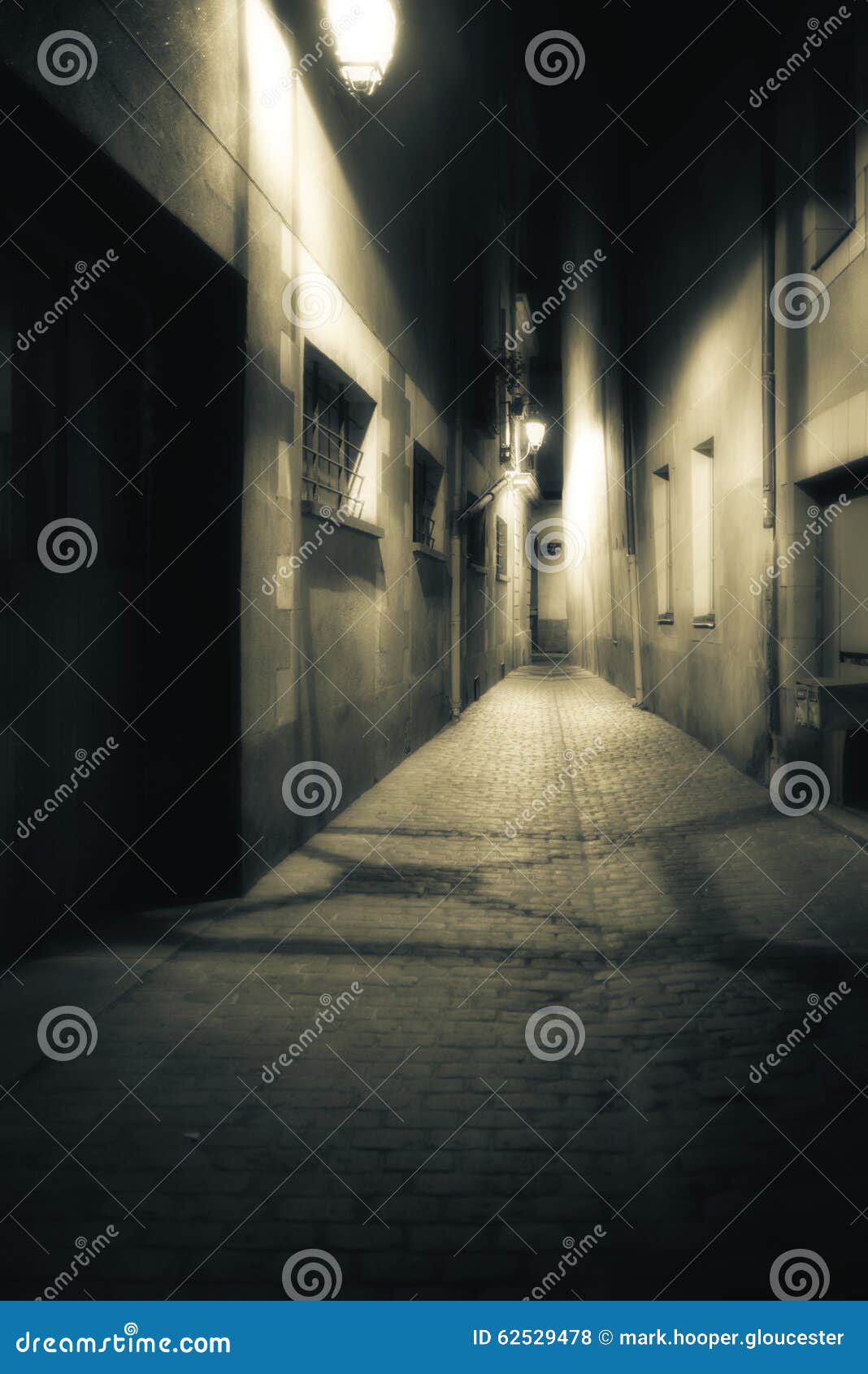 View Down a Dark, Hazy, Glowing Alleyway at Night Stock Photo - Image ...