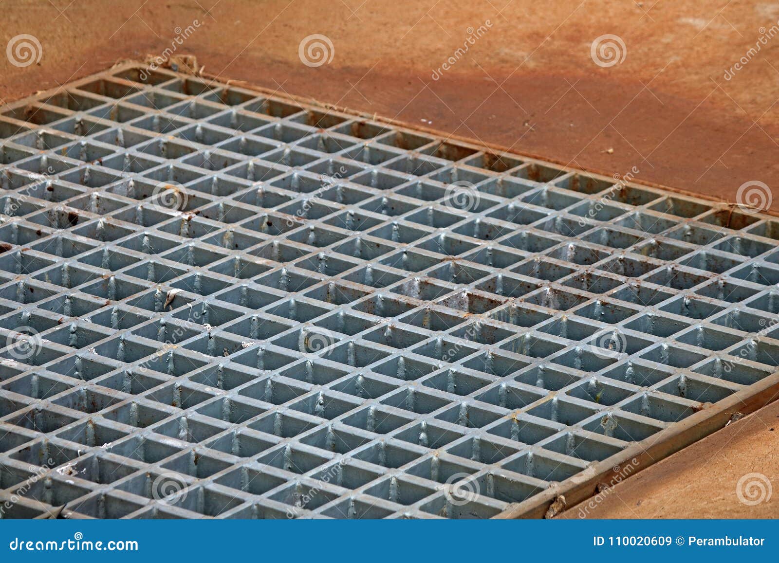 RECTANGULAR METAL GRID COVER OVER DRAIN in CONCRETE SURFACE Stock Image ...