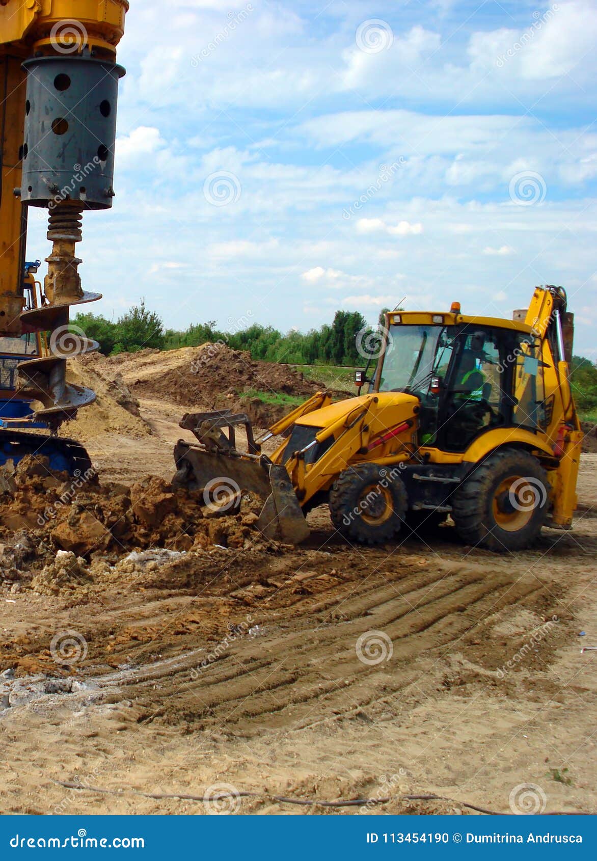 Drilling Machinery and Backhoe Stock Photo - Image of derrick ...