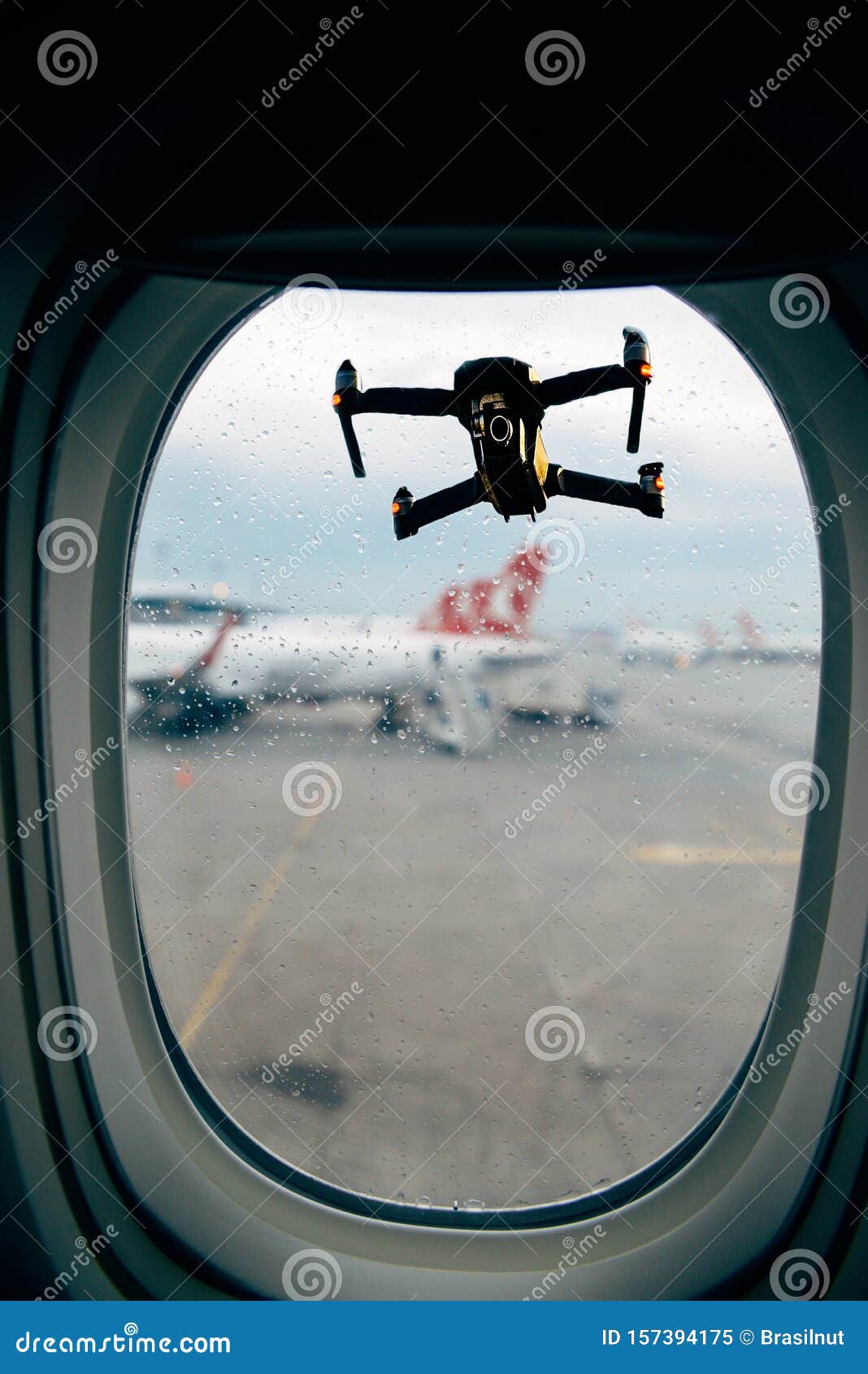 View of Drone Outside Airplane Window at Airport Stock Image - Image of ...