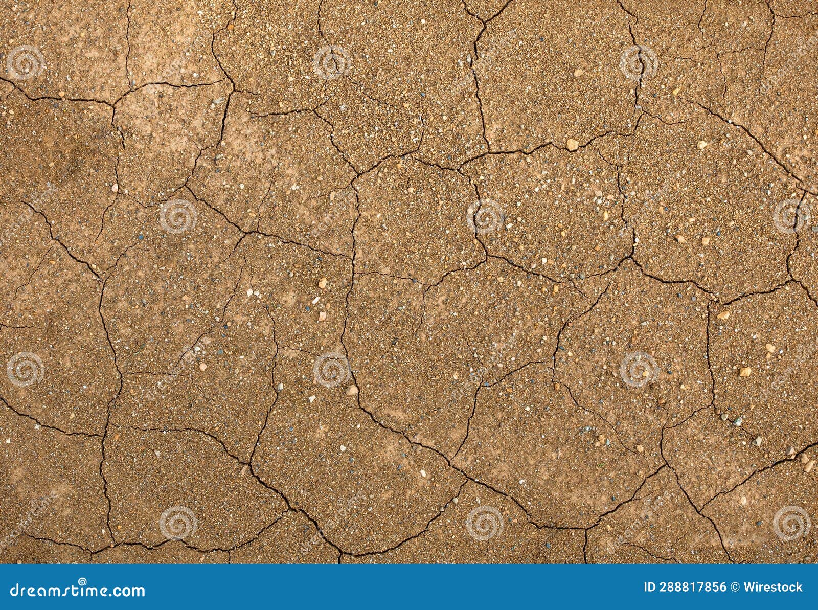 View of Dry and Cracked Clay Soil, with Crevices Running through it ...