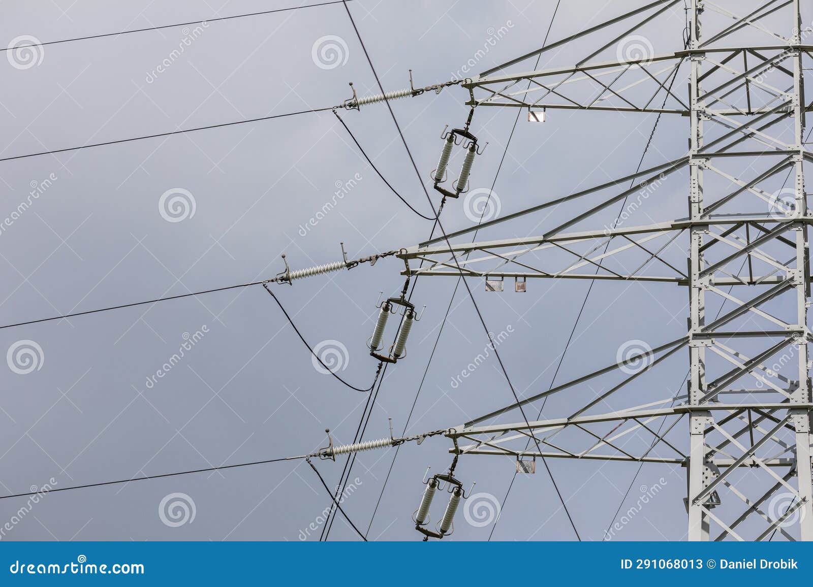 View of Electrical Insulators on a High-voltage Overhead Line Pole ...