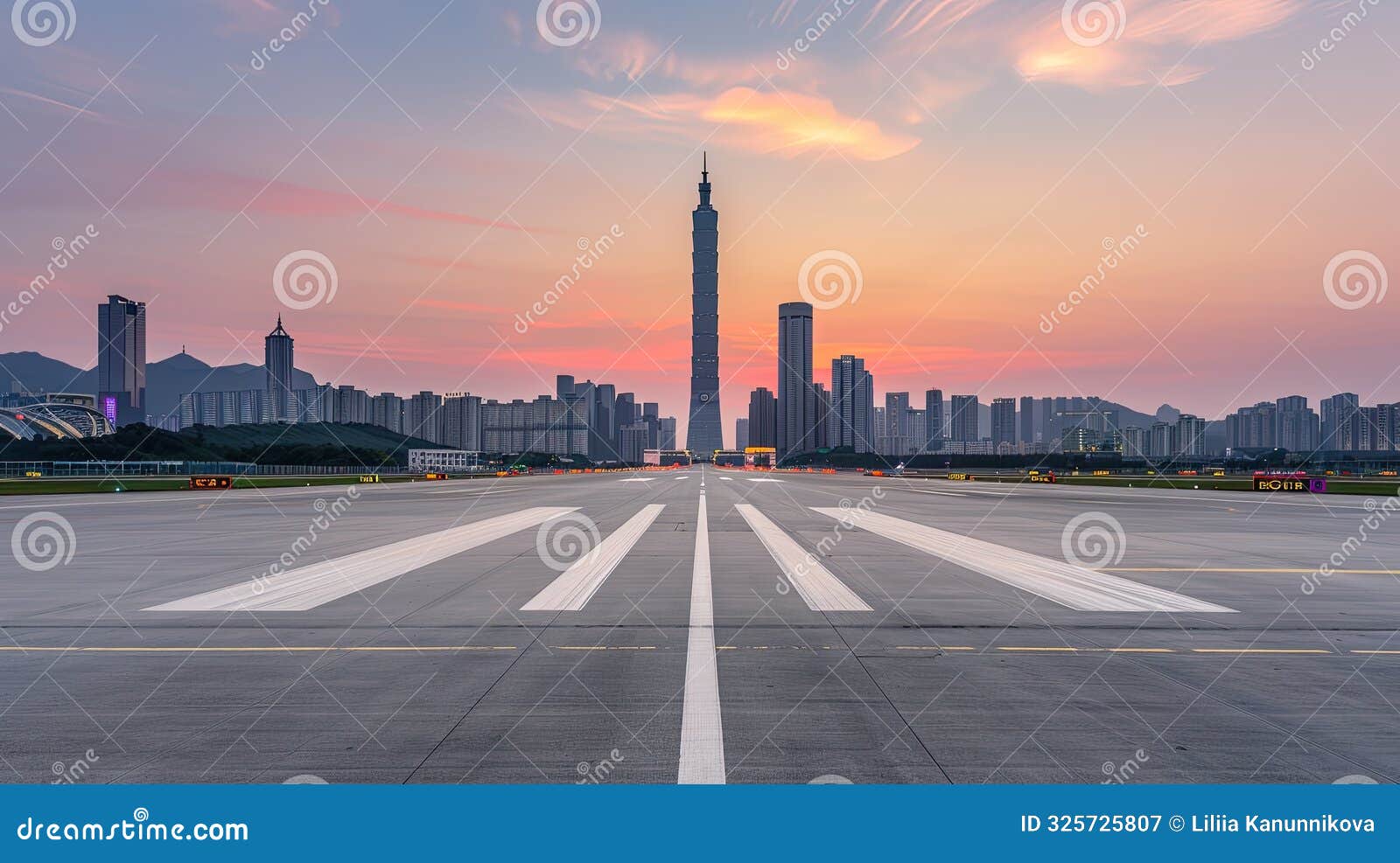 A View of an Empty Airport Runway with Several Parallel White Lines ...