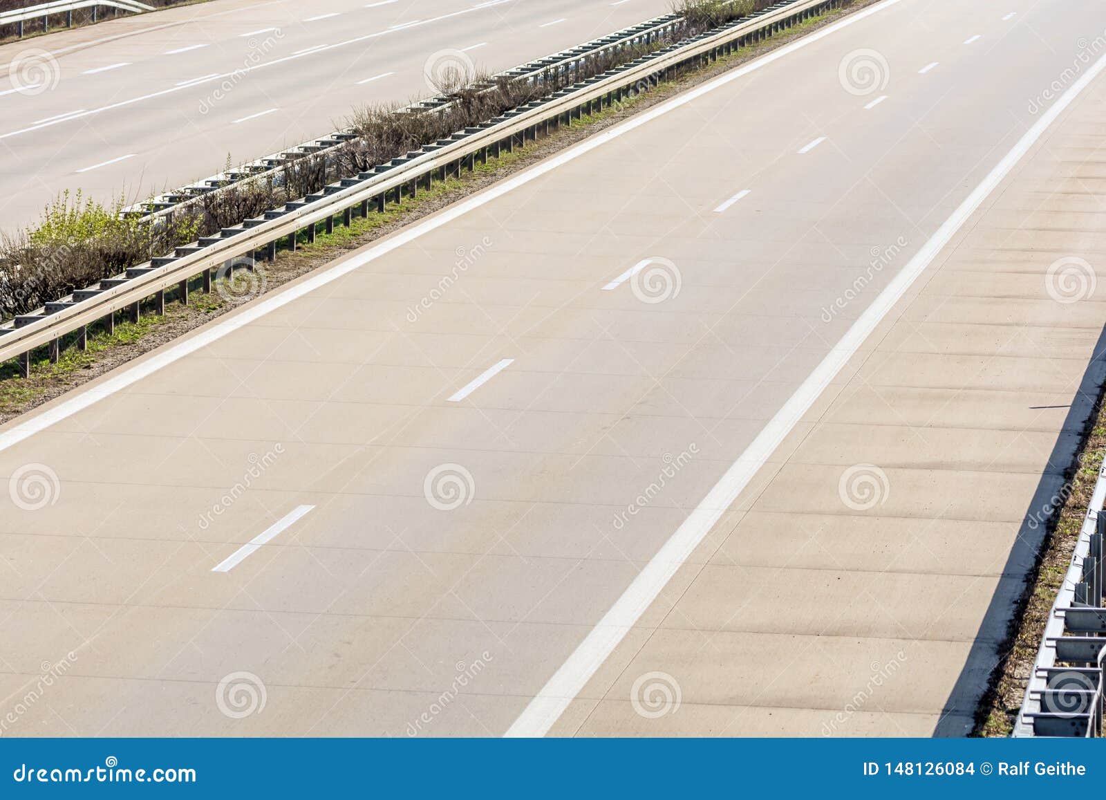 Empty Two-lane Highway with Crash Barriers Stock Photo - Image of ...