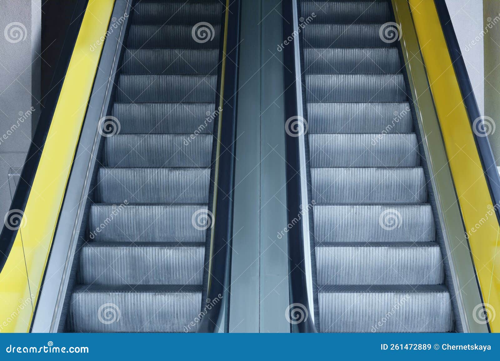 View on Empty Parallel Escalators with Yellow Balustrades Stock Image ...