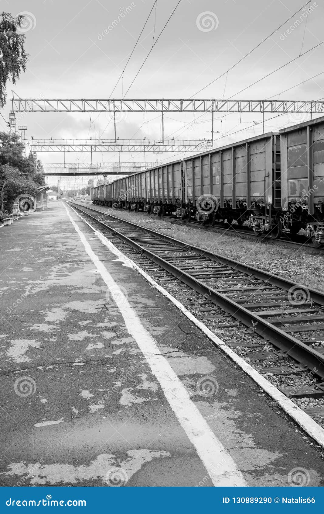 View of Empty Railway Platform and Freight Train. Stock Photo - Image ...