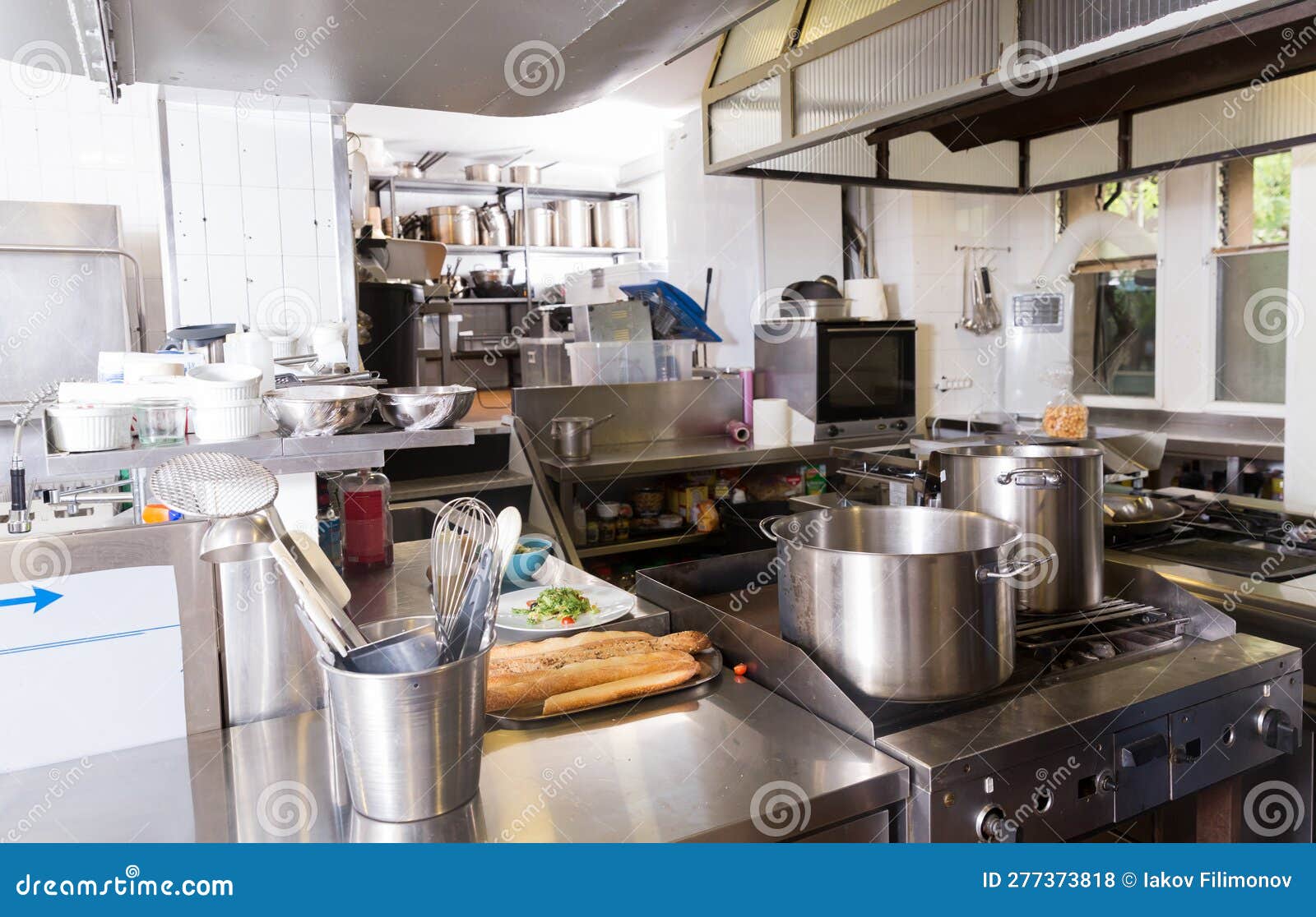 Empty restaurant kitchen stock photo. Image of counters - 277373818