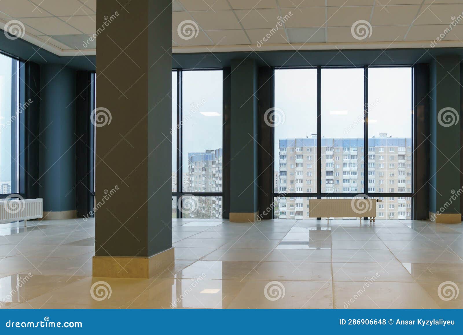 View of an Empty Spacious Hall with Columns and Panoramic Windows ...
