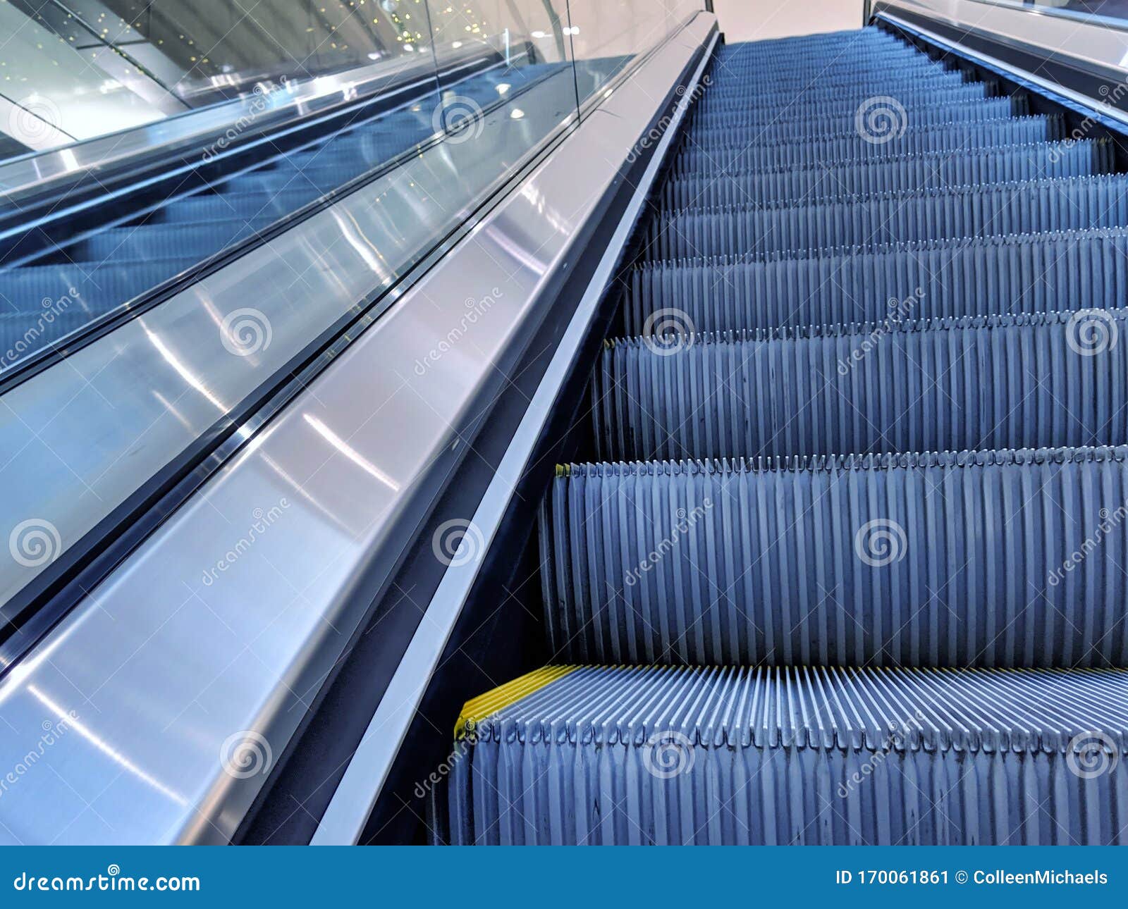 Empty, Yellow Lined Escalator Steps Inside a Building Stock Image ...