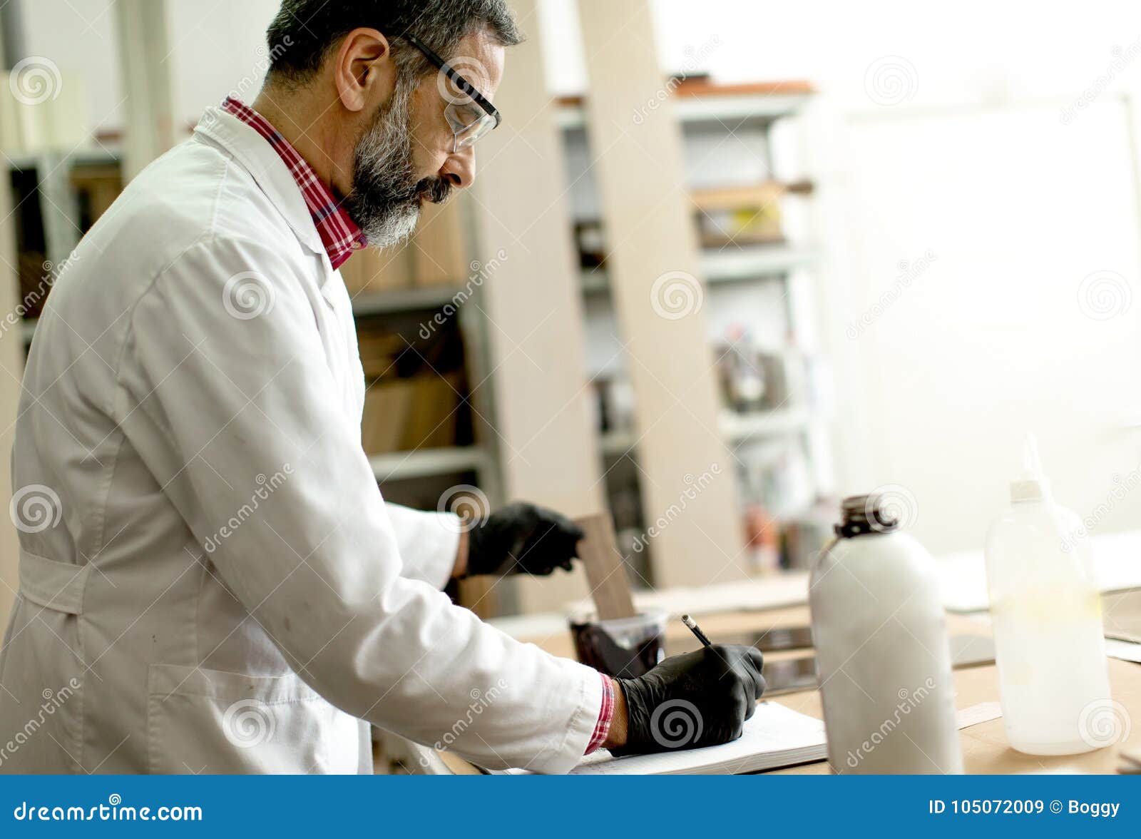 Engineer in the Laboratory Examines Ceramic Tiles Stock Image - Image ...