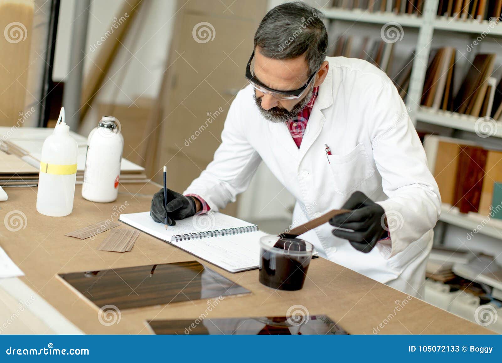 Engineer in the Laboratory Examines Ceramic Tiles Stock Image - Image ...