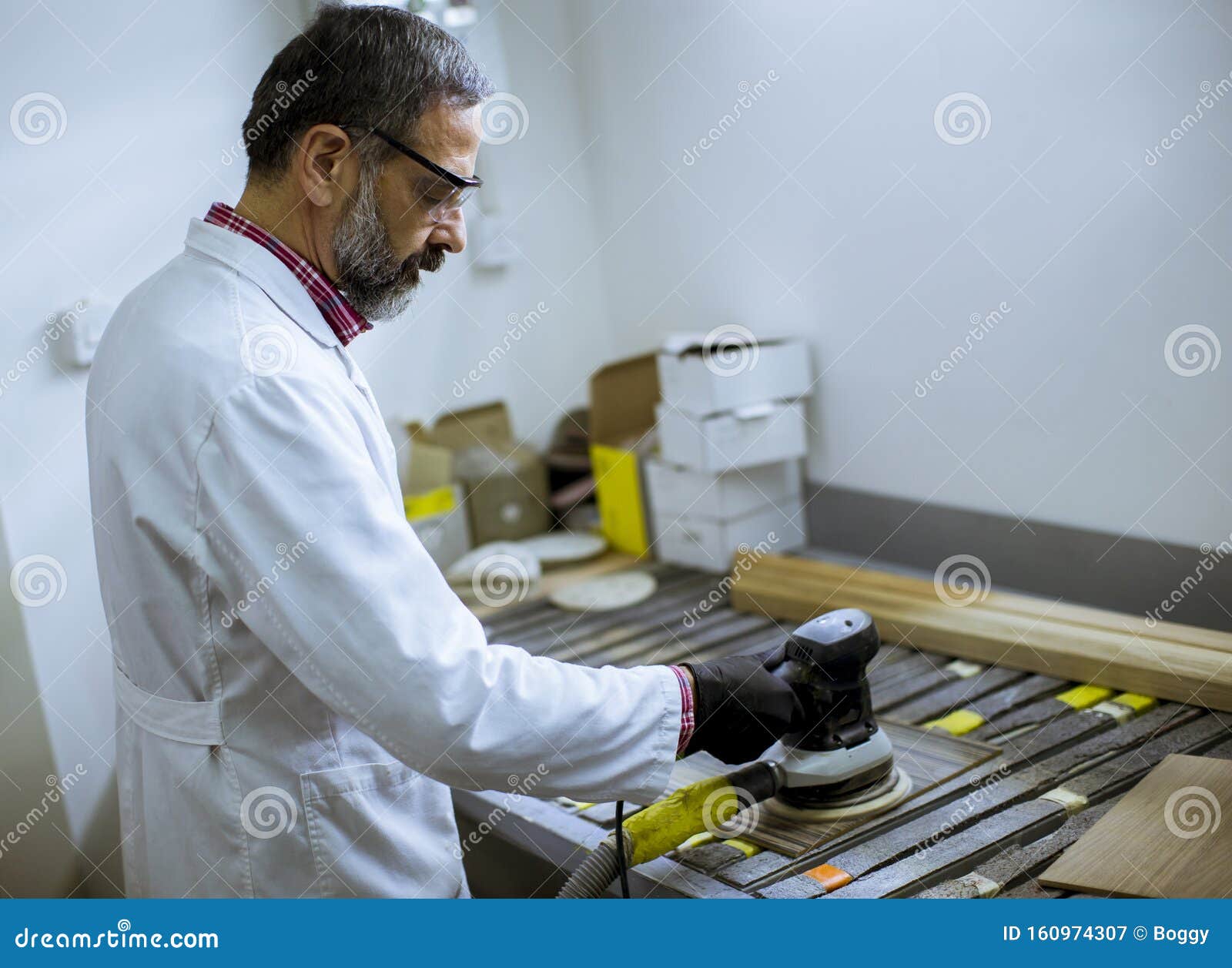 View at Engineer in the Laboratory Examines Ceramic Tiles Stock Image ...
