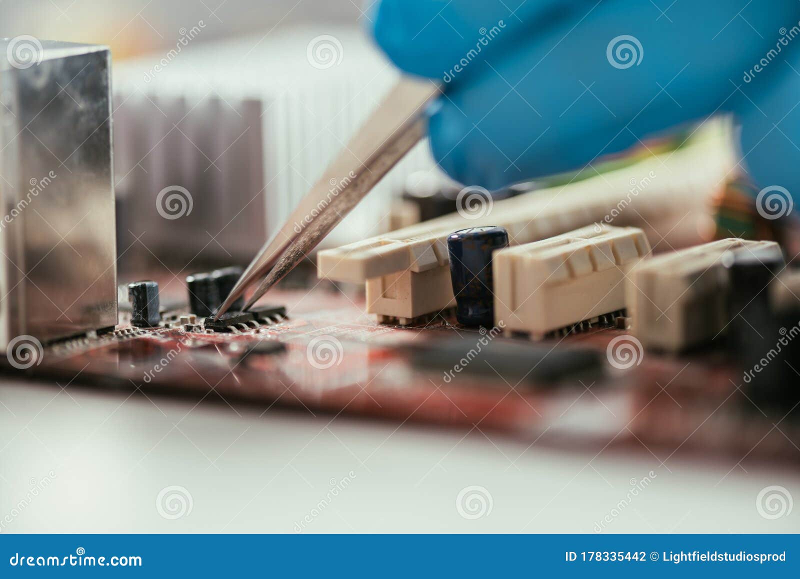 View of Engineer Testing Computer Motherboard with Tweezers Stock Photo ...