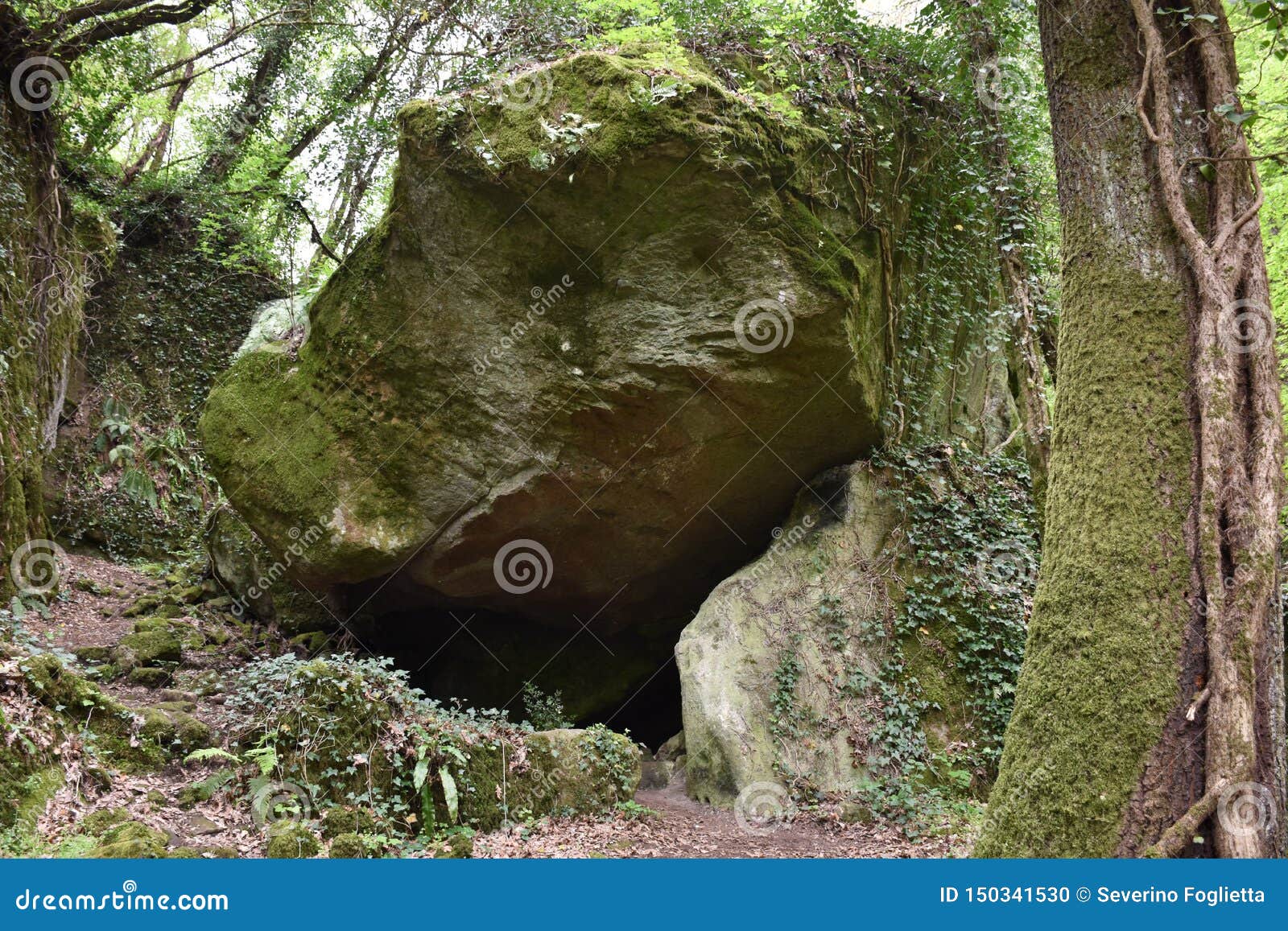 View of the Entrance To the Stone Cave Stock Photo - Image of entrance ...